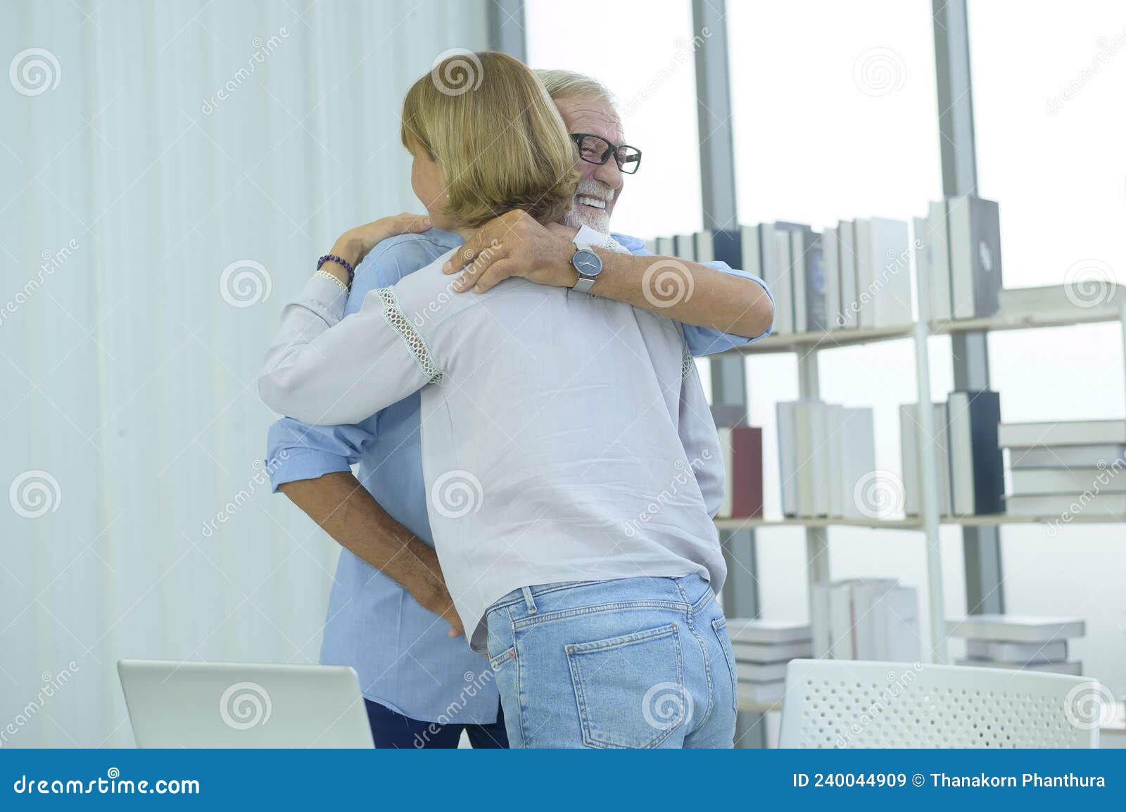 Senior Caucasian Business People Hugging for Successful Project Stock ...