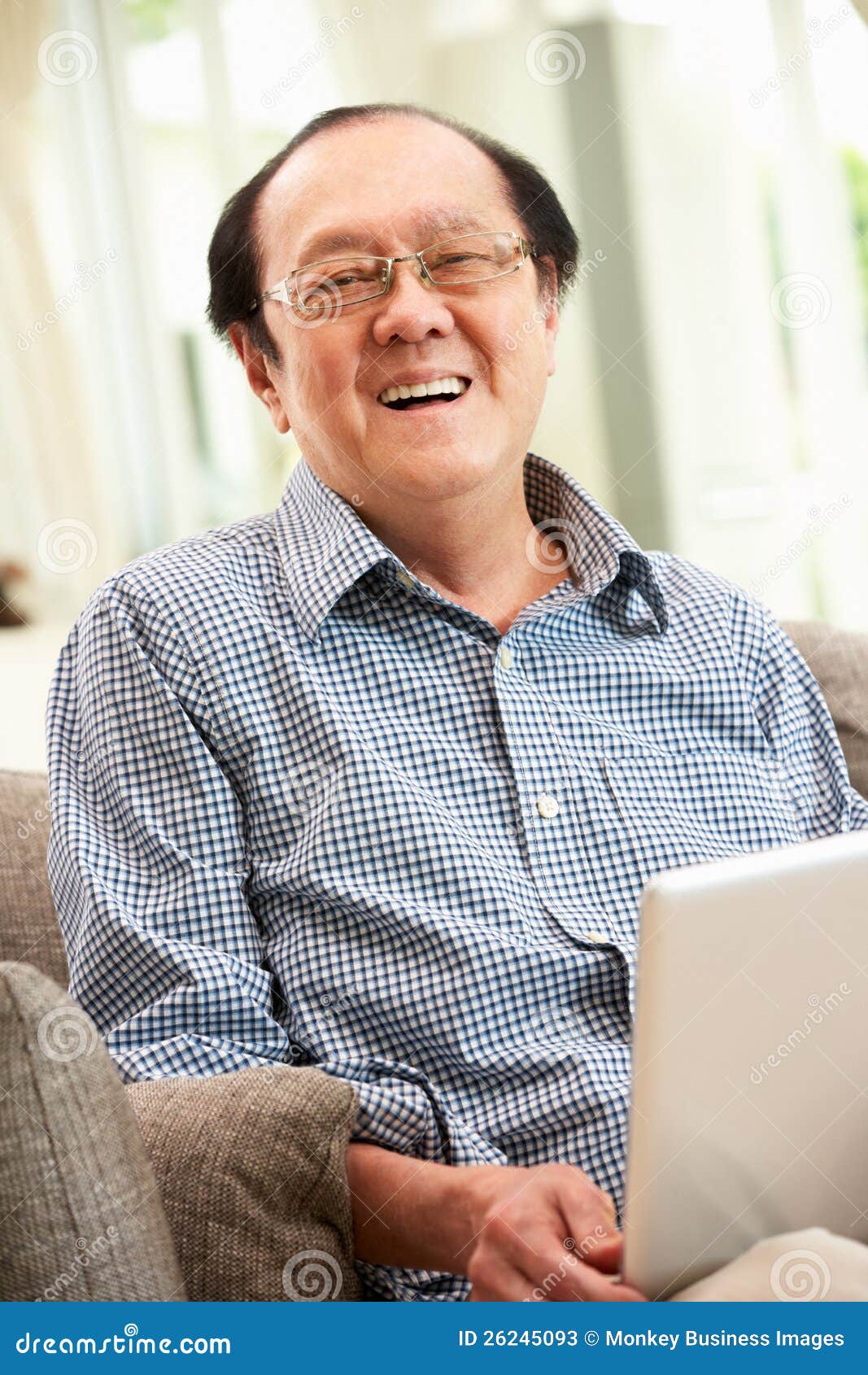 Senior Chinese Man Using Laptop Whilst Relaxing Stock Image - Image of ...