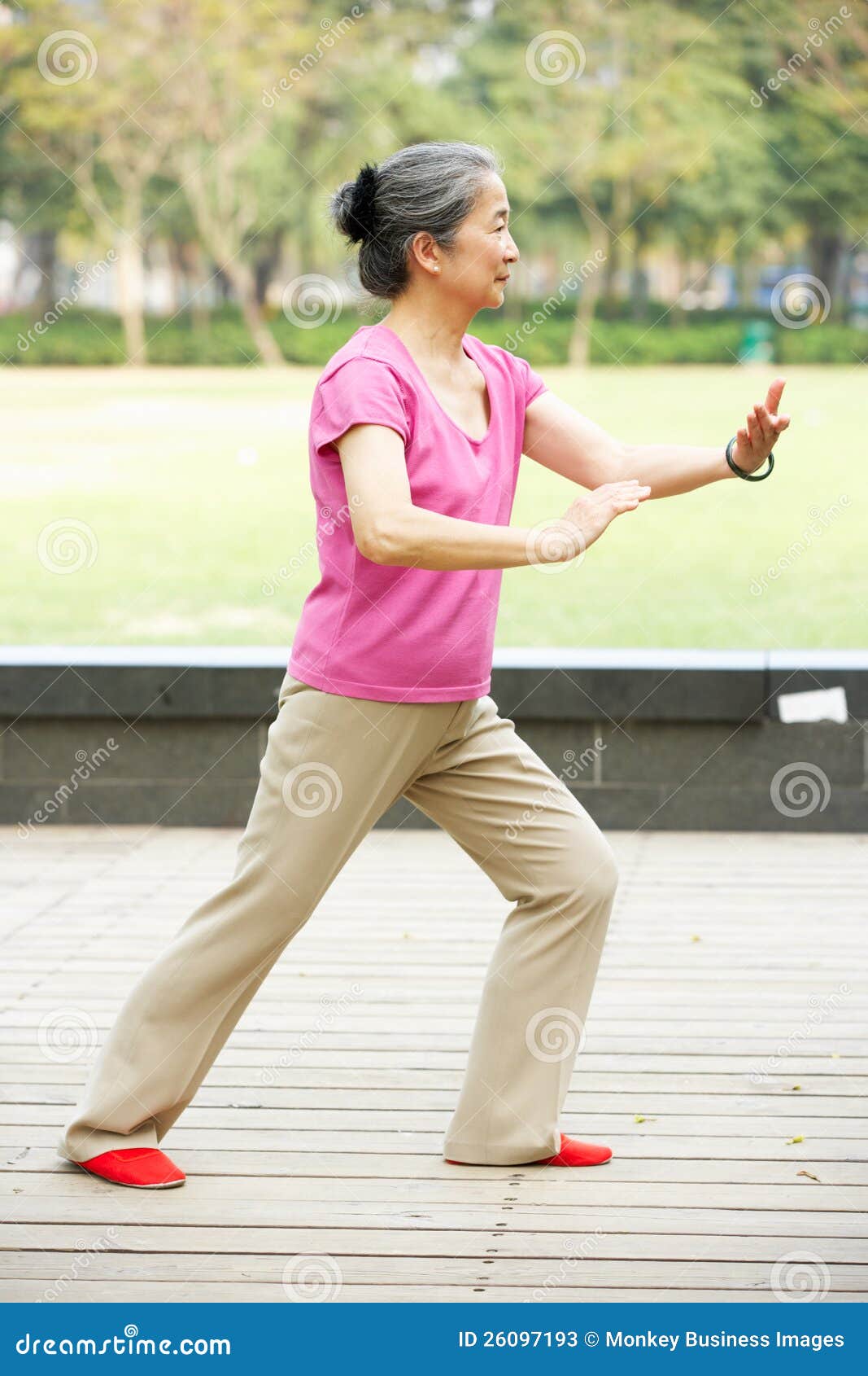 Senior Chinese Woman Doing Tai Chi In Park Stock Image Image 26097193 7486