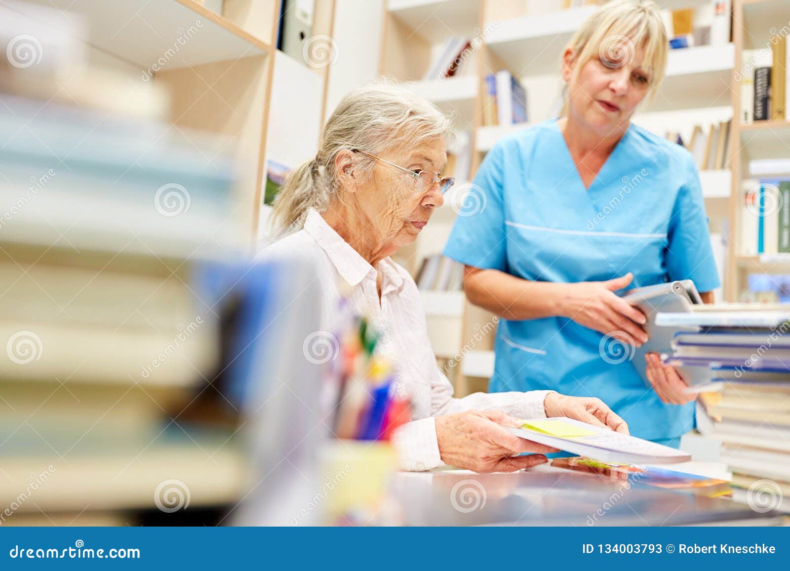 Senior is Educating in the Library Stock Image - Image of glasses ...