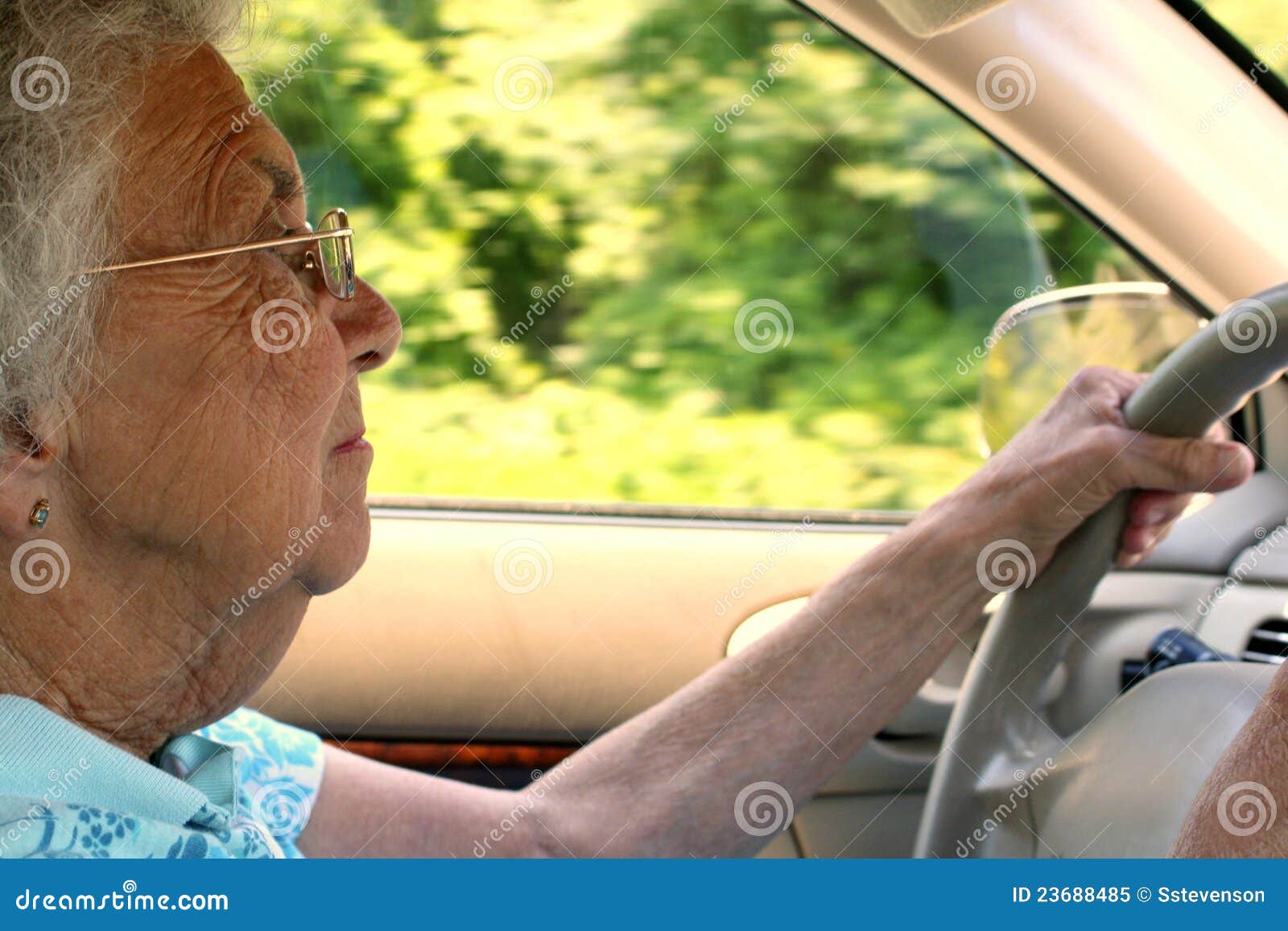Senior Citizen Woman Driving in Profile Stock Image - Image of ...