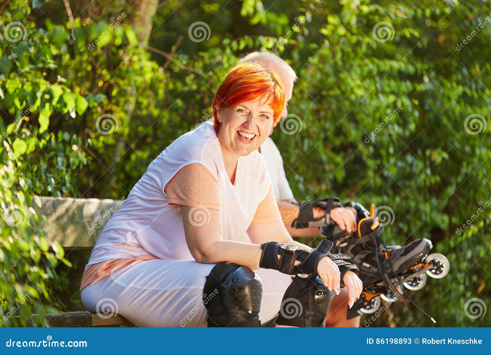 Senior Citizens Taking a Break from Skating Stock Image - Image of ...