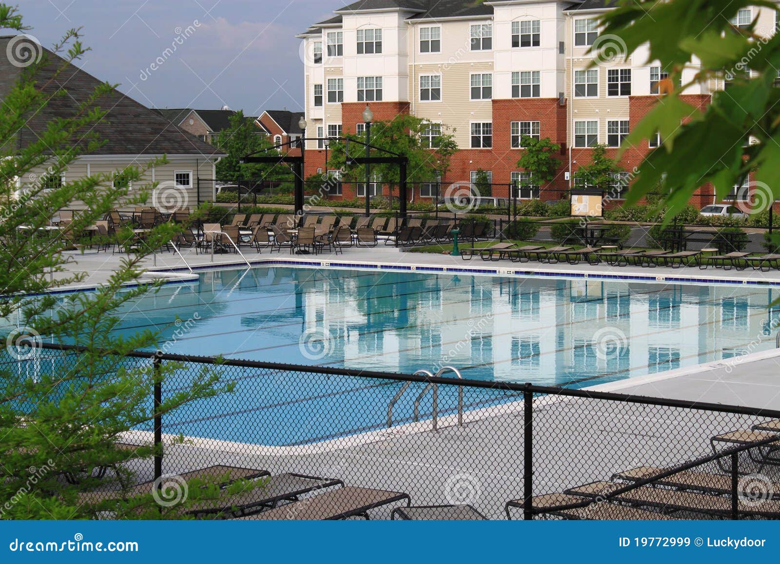 Community Pool stock image. Image of housing, chairs - 19772999
