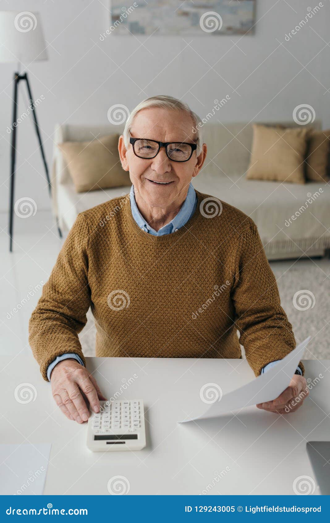 Senior Confident Man Using Calculator and Holding Stock Image - Image ...