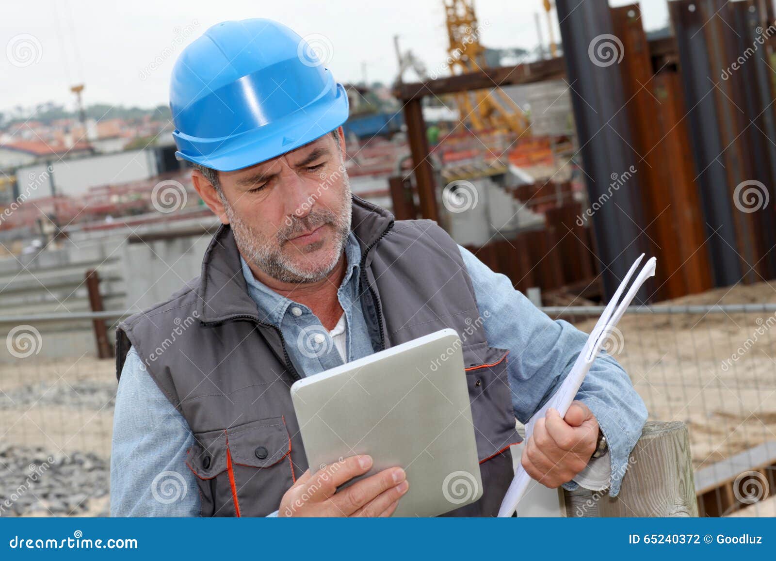 Senior Construction Manager with Tablet and Blueprint Stock Photo ...