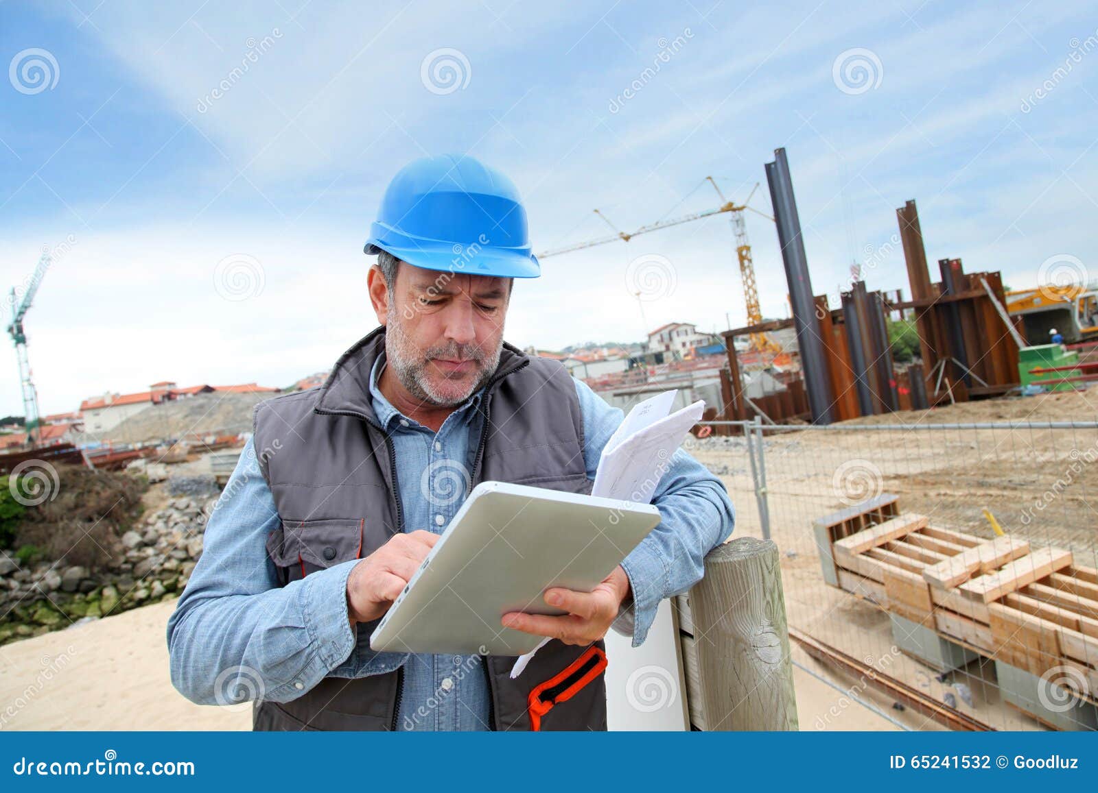 Senior Construction Manager Using Tablet on Site Stock Photo - Image of ...