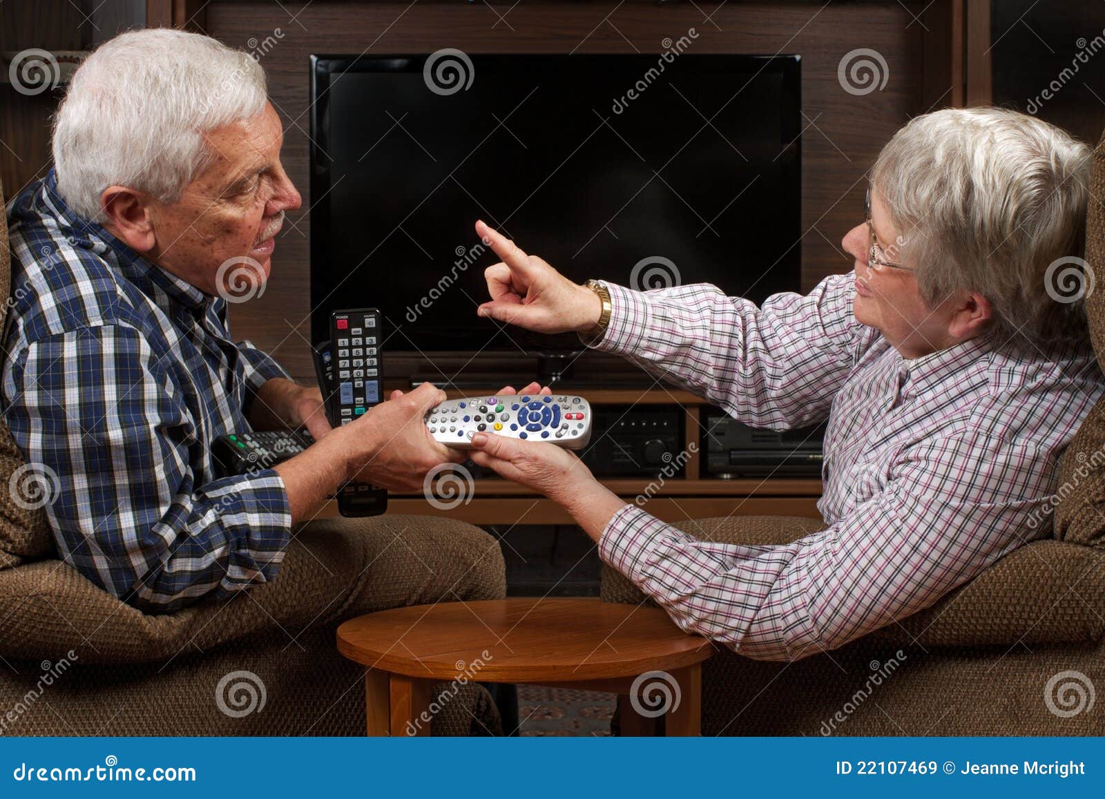 Senior Couple Arguing Over TV Remote Control Royalty Free Stock Images ... Senior Couple Arguing Over TV Remote Control Royalty Free Stock Images ...