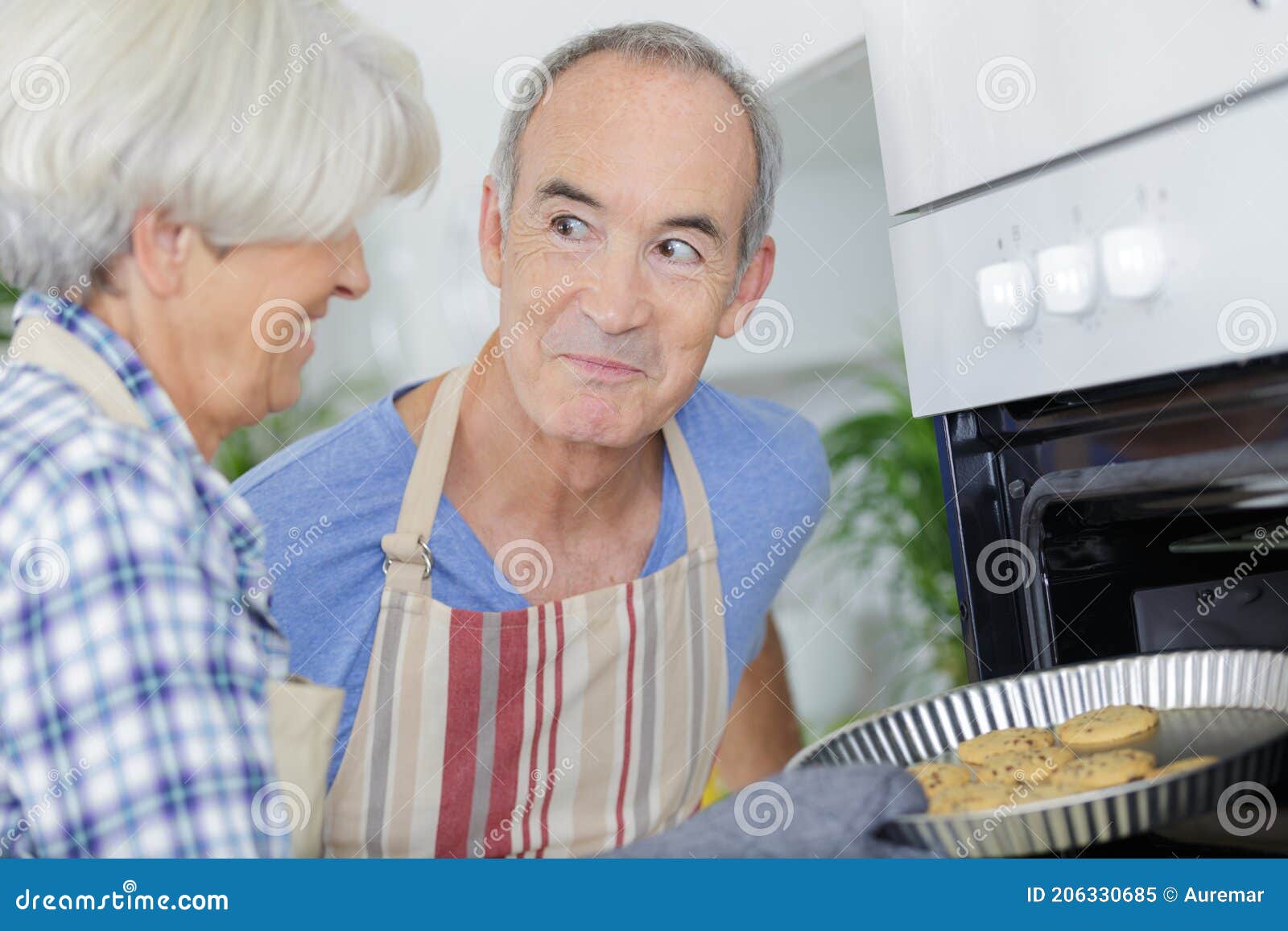 Senior Couple Baking Cookies in Kitchen Stock Image - Image of bakery ...