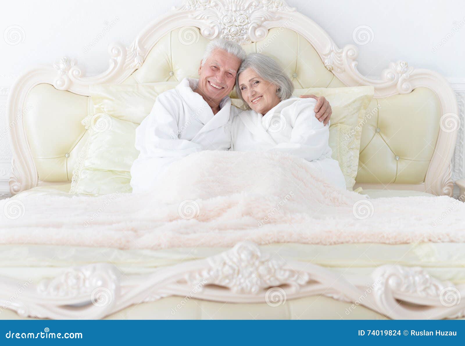 Senior couple in bed stock photo. Image of relaxed, elderly - 74019824