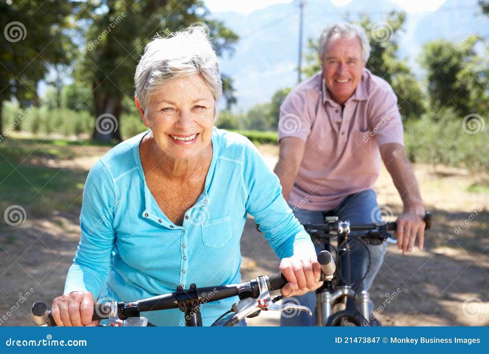 Senior couple on bike ride stock image. Image of bikes - 21473847