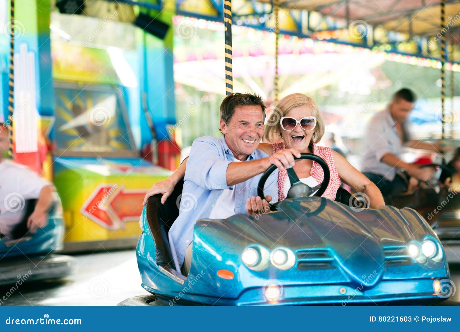Senior Couple in the Bumper Car at the Fun Fair Stock Image - Image of ...