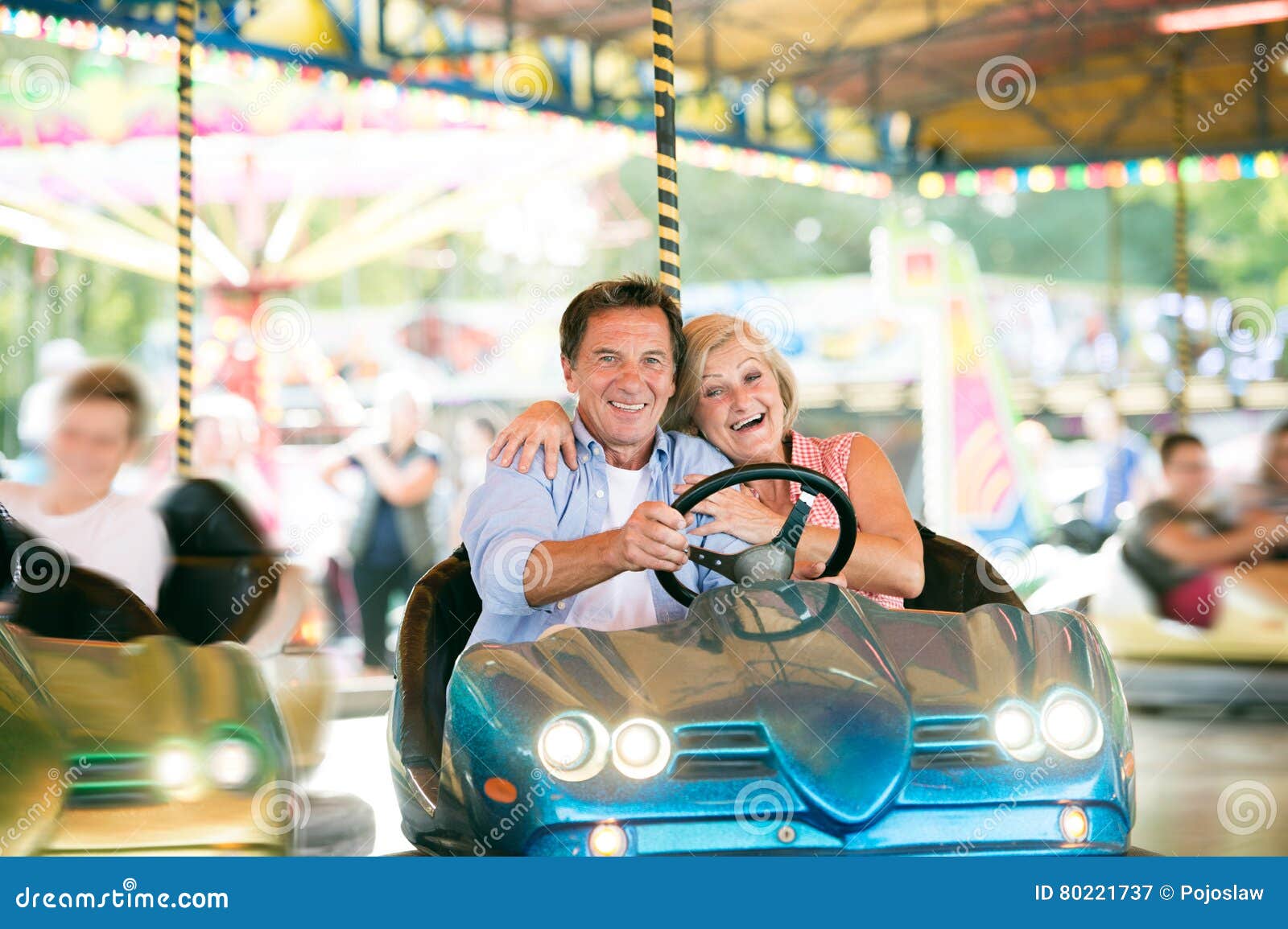 Senior Couple in the Bumper Car at the Fun Fair Stock Image - Image of ...