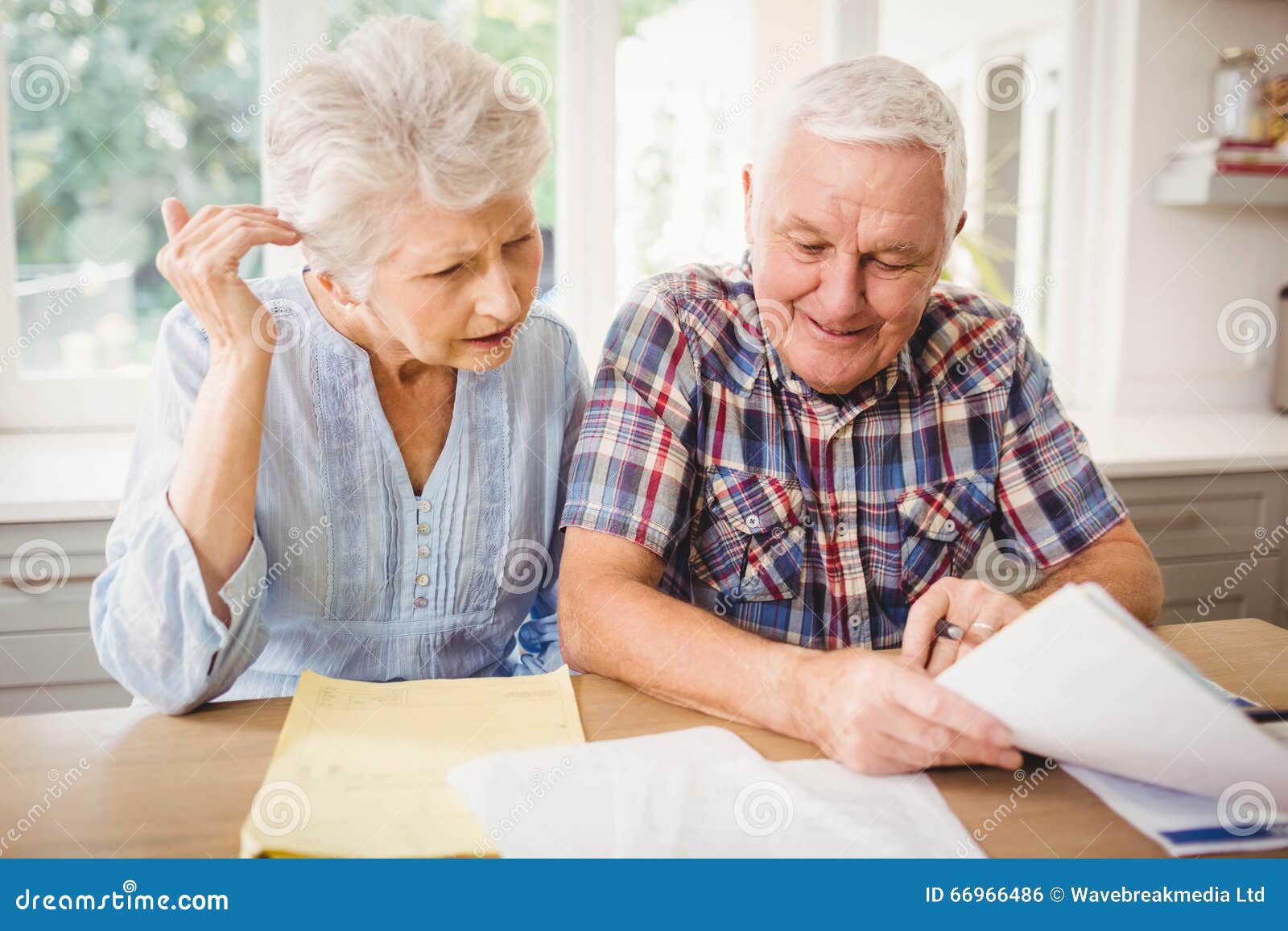 Senior Couple Checking Their Bills Stock Photo - Image of grey ...
