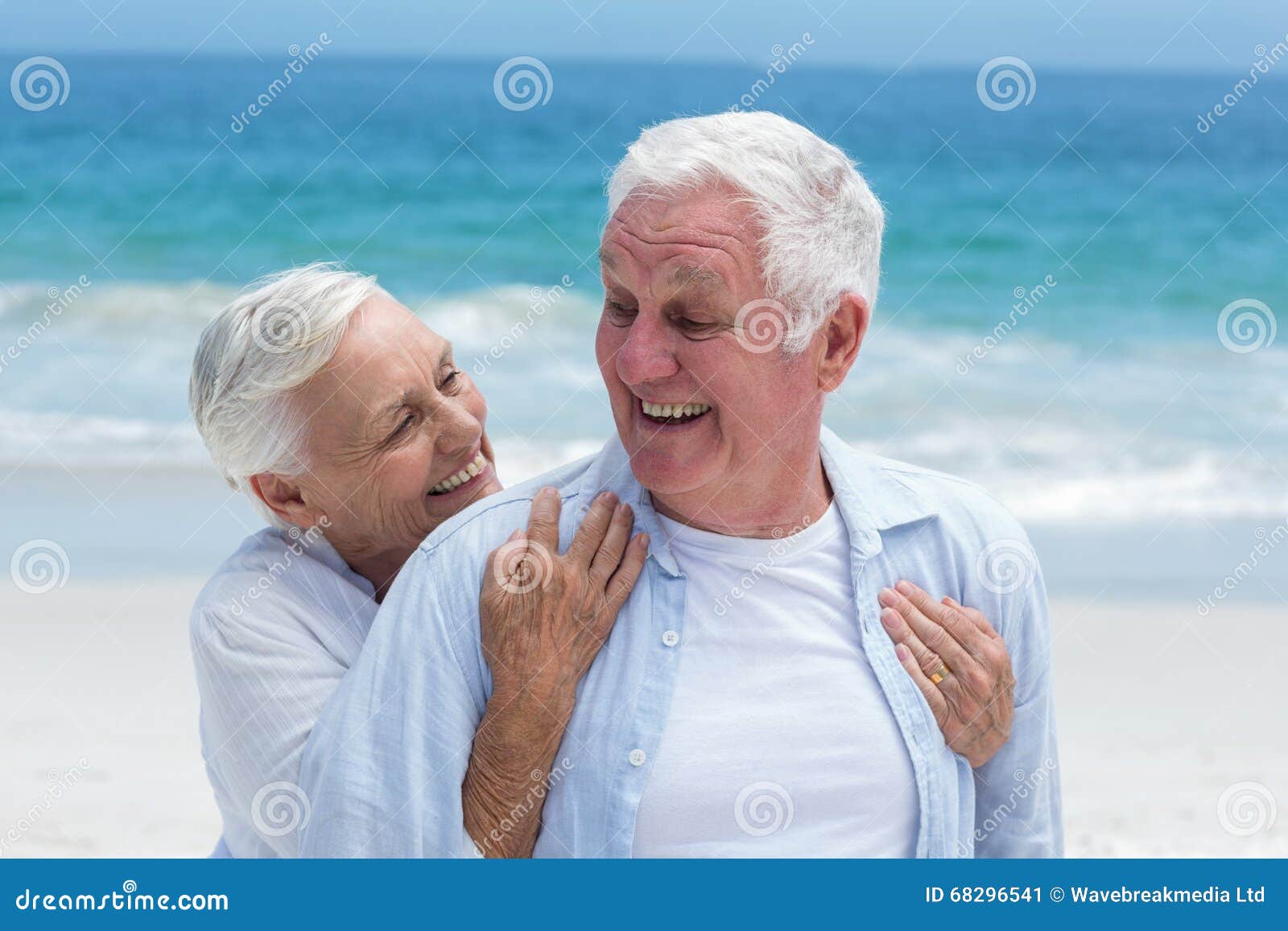Senior Couple Embracing with Arms Around Stock Image - Image of ...