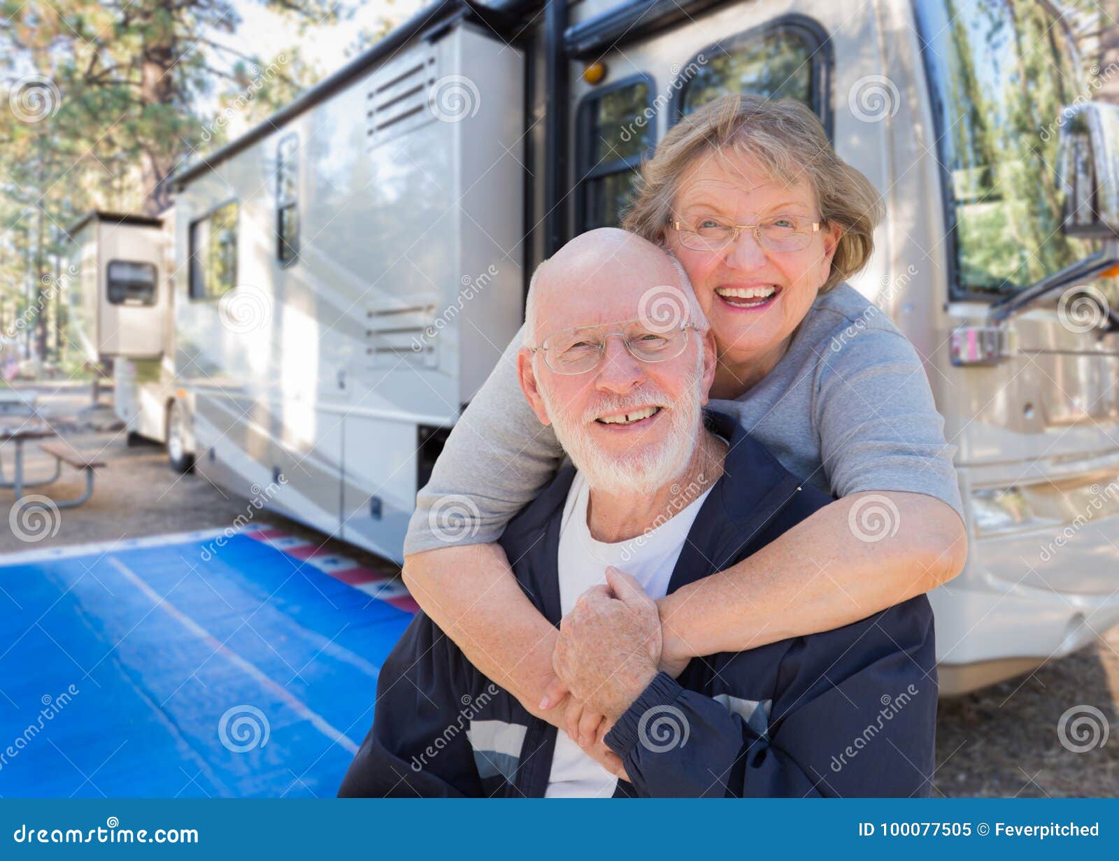 Senior Couple in Front of Their Beautiful RV at Campground. Stock Image ...