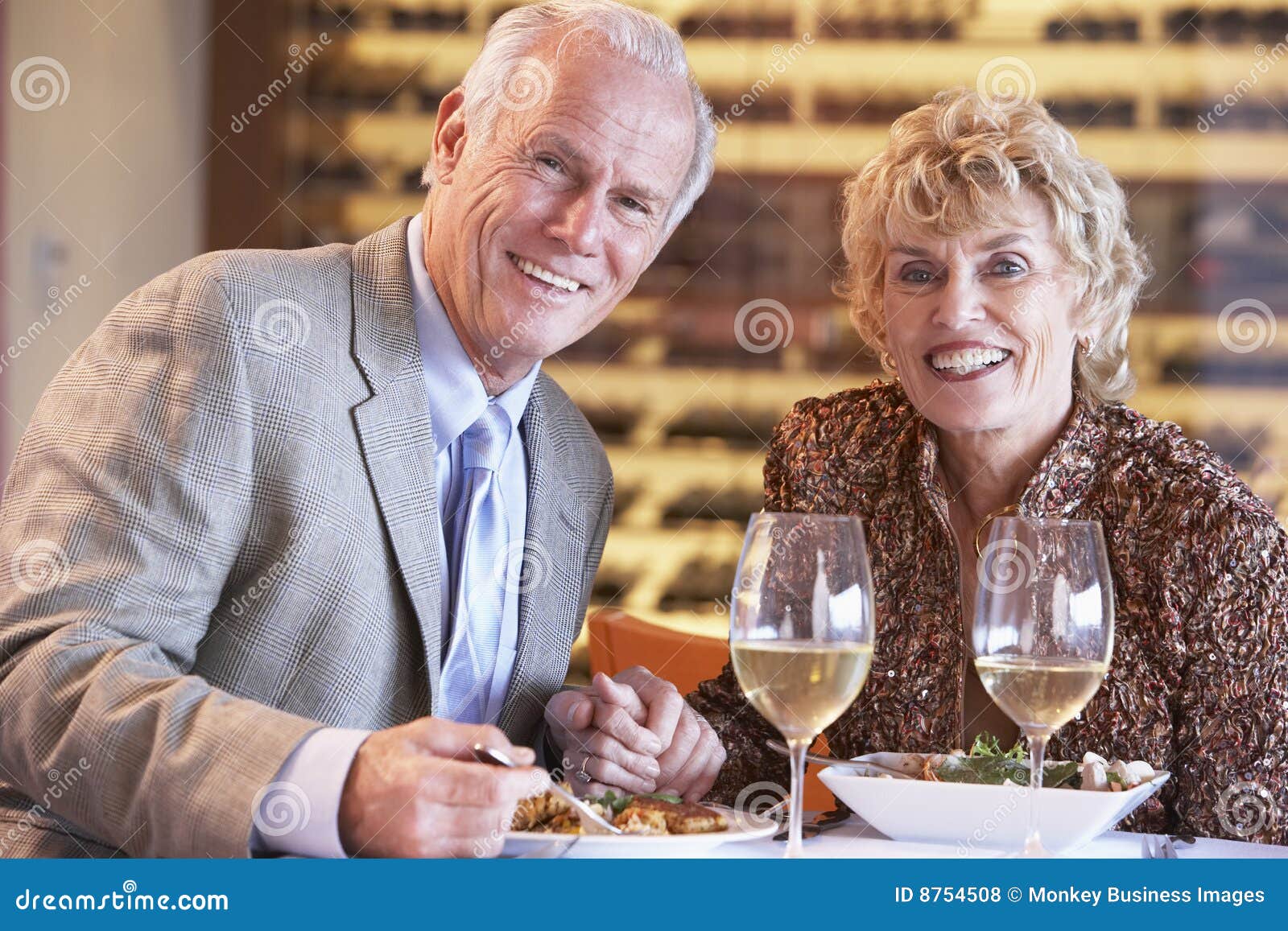 Senior Couple Having Dinner at a Restaurant Stock Photo - Image of ...