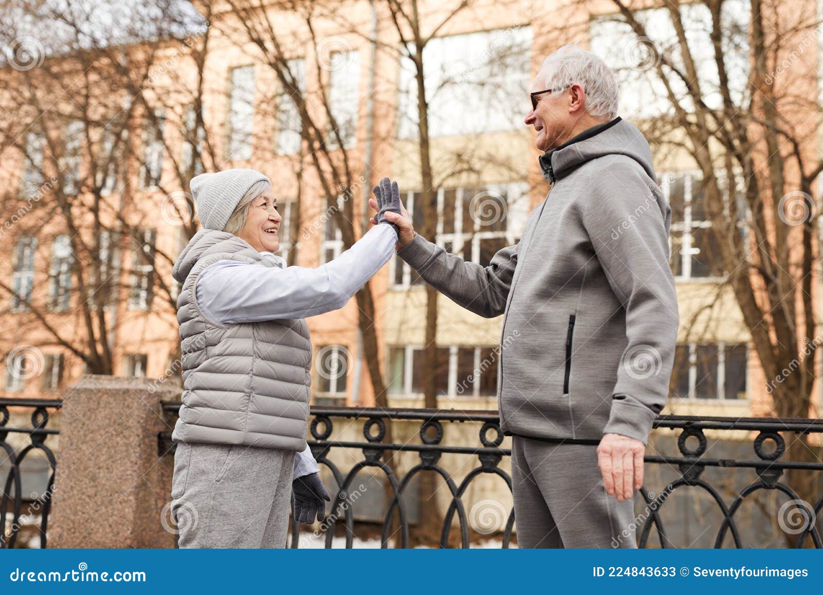 Senior Couple High Five stock image. Image of retirement - 224843633