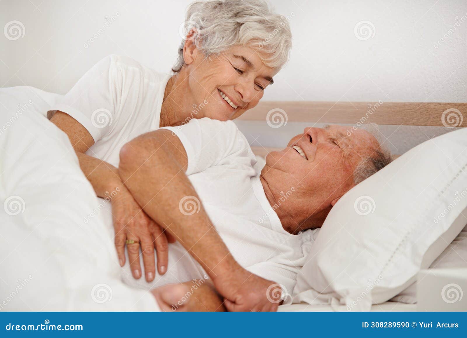 Senior Couple Hug And Communication In Bed Relaxing And Love In