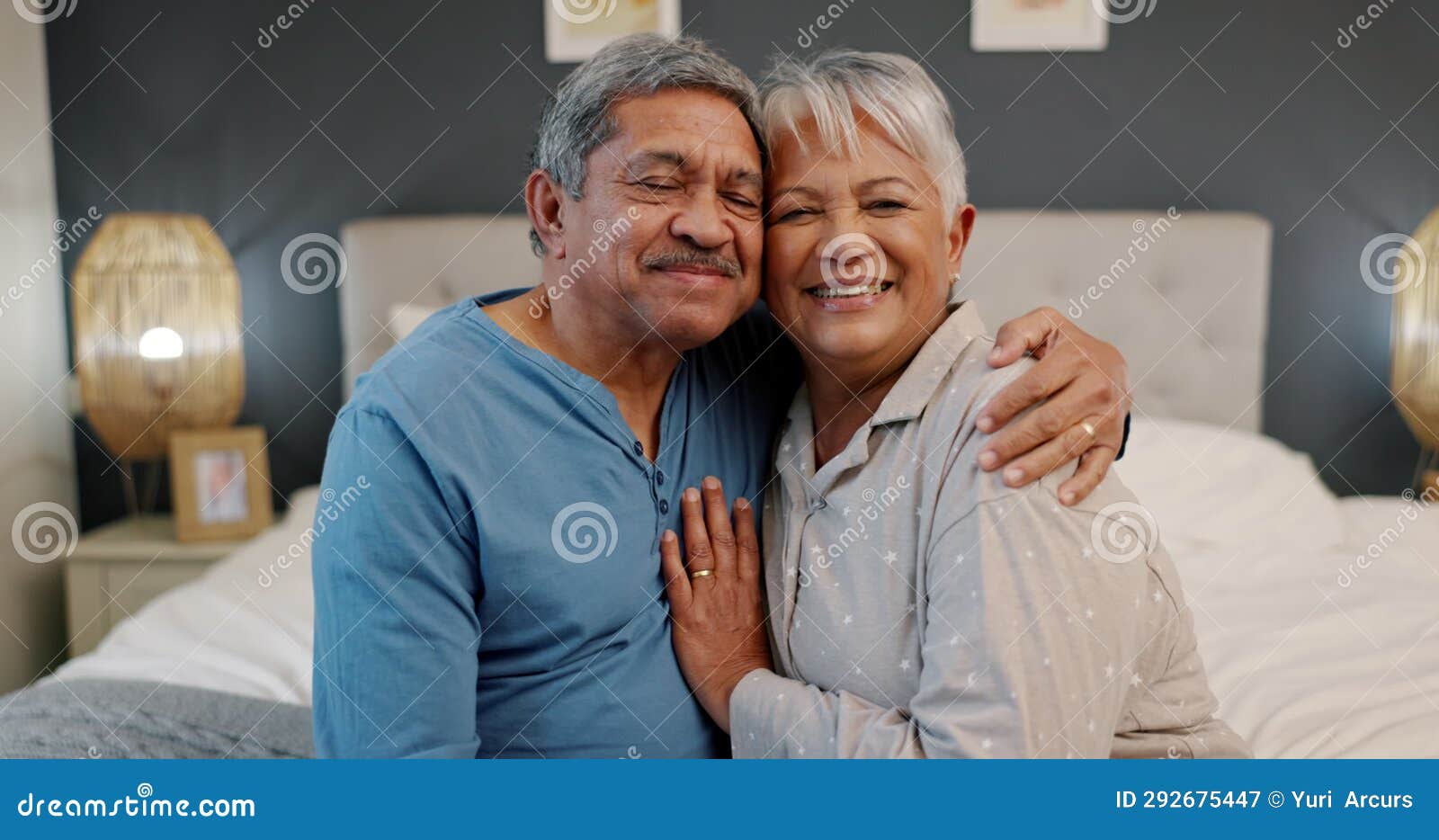Senior Couple Hug And Love In Bedroom On Bed With Care Support And