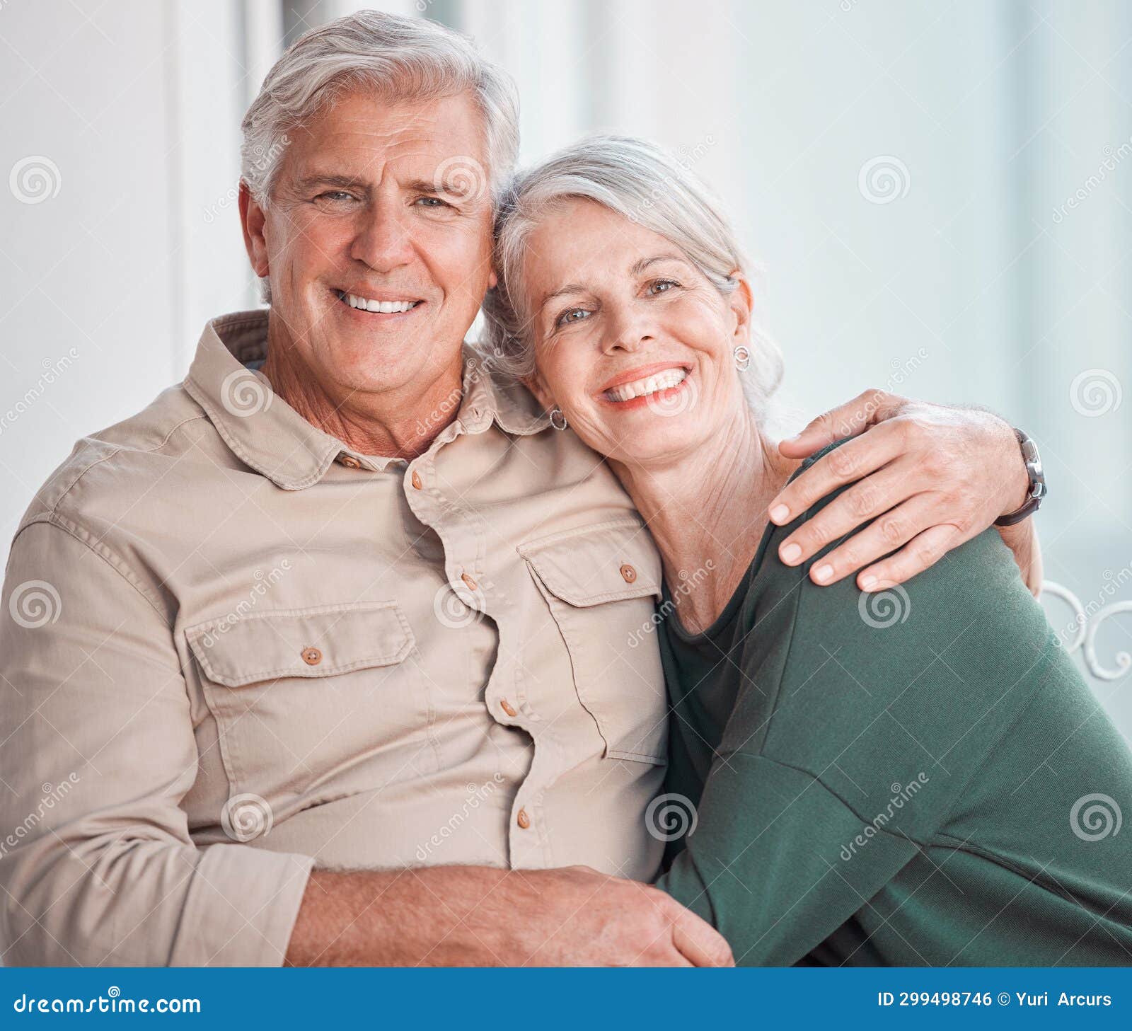 Senior Couple Hug And Portrait On Couch With Smile Care And Bonding
