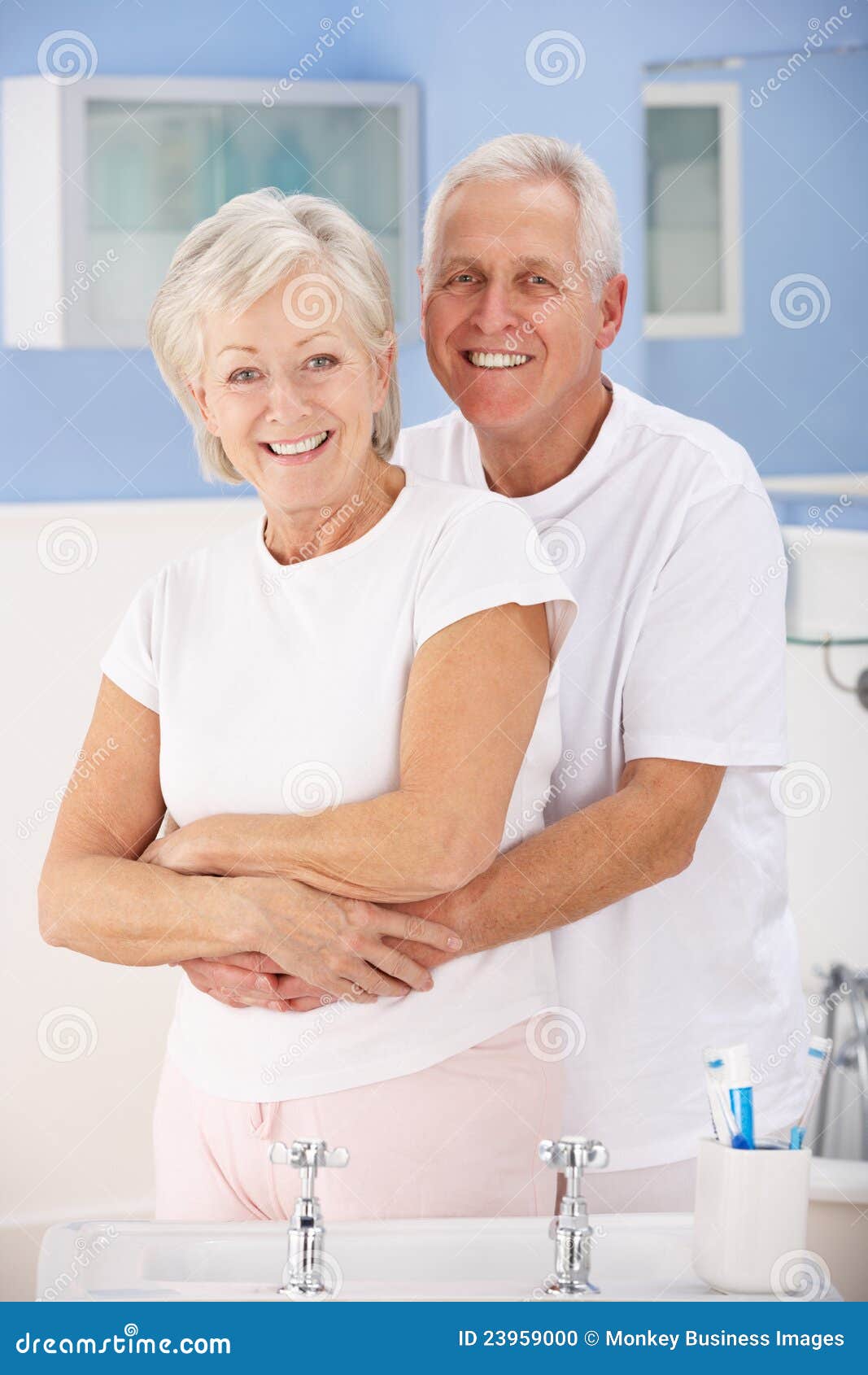 Senior Couple Hugging in Bathroom Stock Photo - Image of male, retired ...