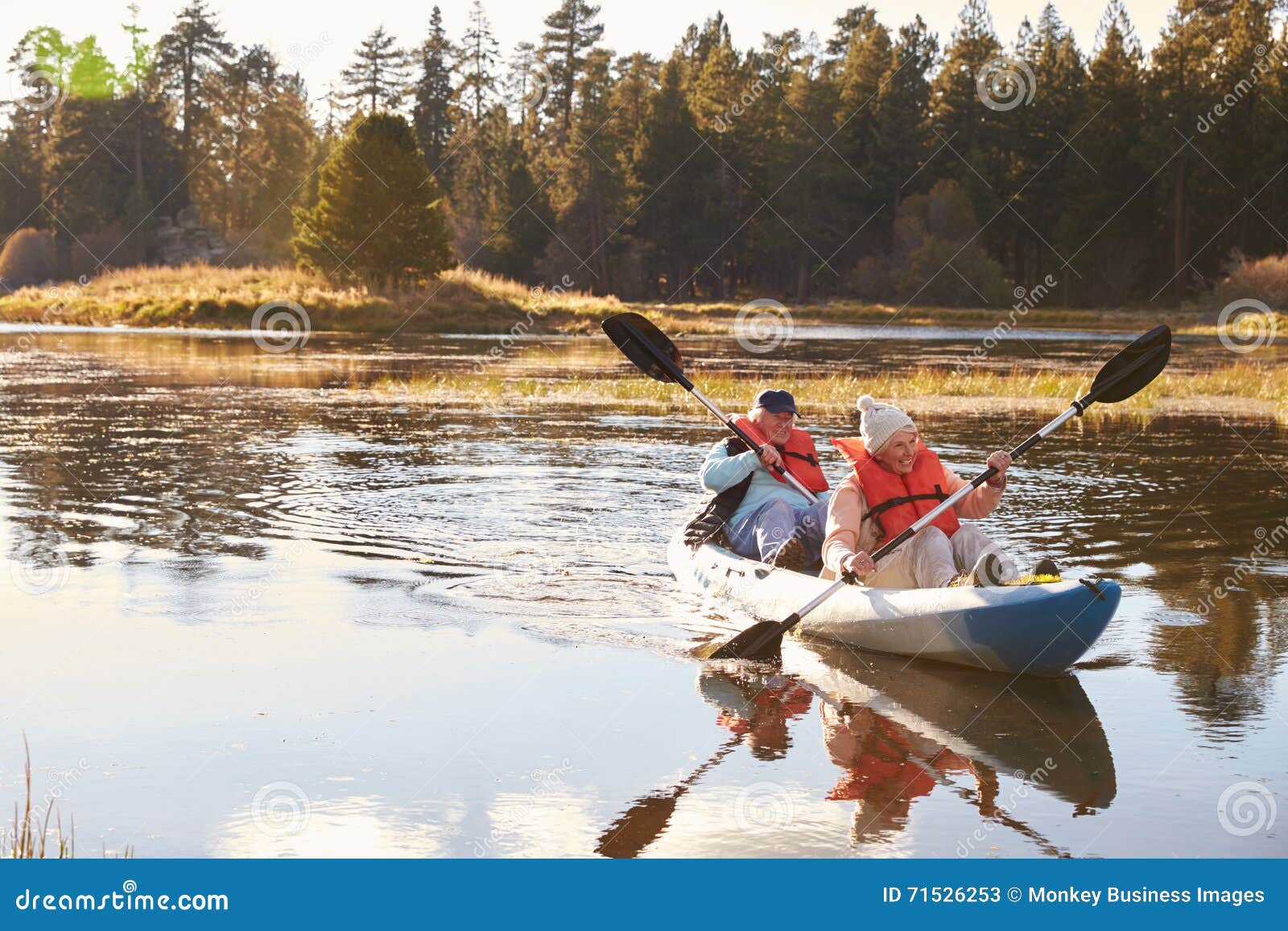 Senior Couple Kayaking on Lake, Front View Stock Image - Image of ...