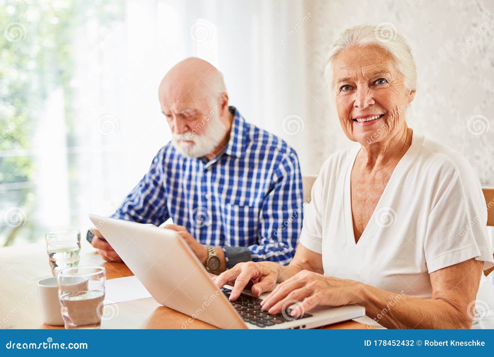 Senior Couple with Laptop Computer at Home Stock Photo - Image of ...