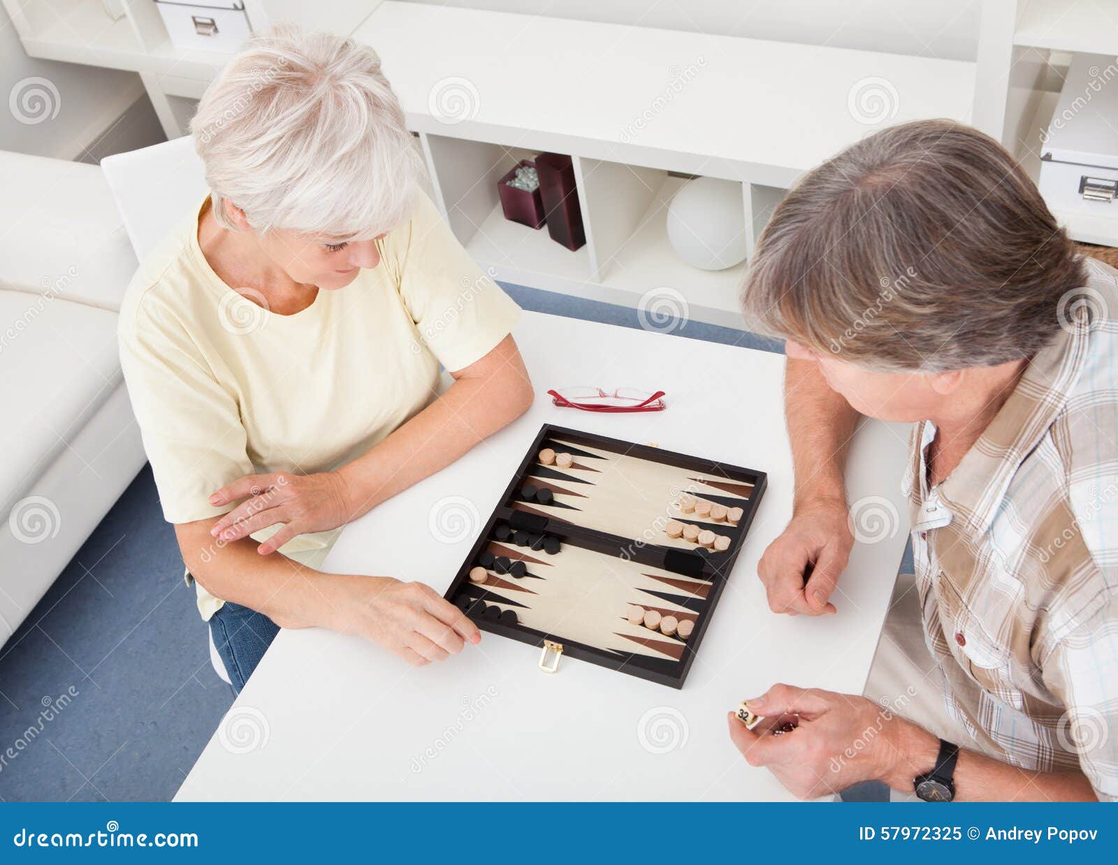 Senior Couple Playing Backgammon Stock Image - Image of indoors, board ...