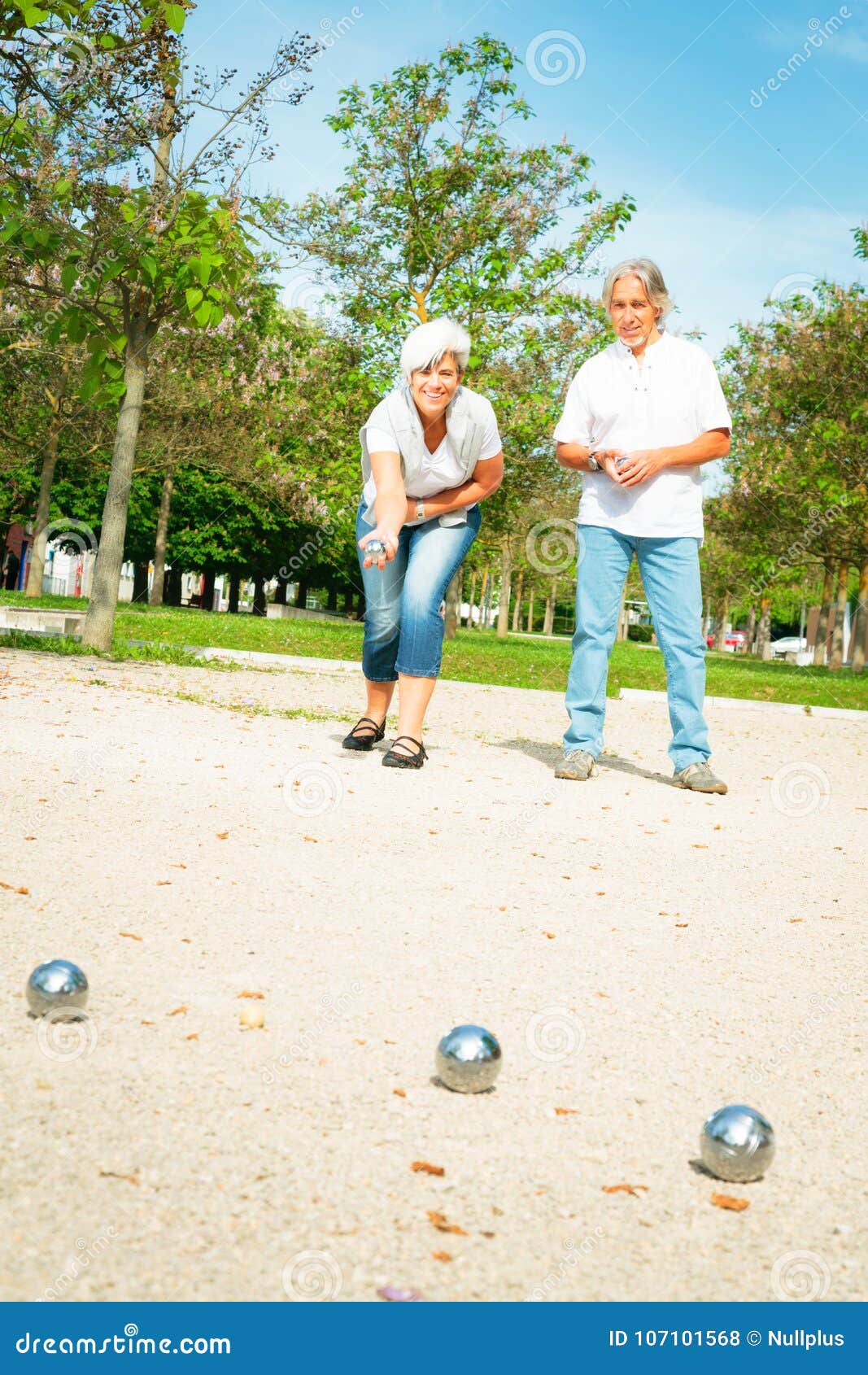 Senior Couple Playing Boule Stock Photo - Image of retirement ...