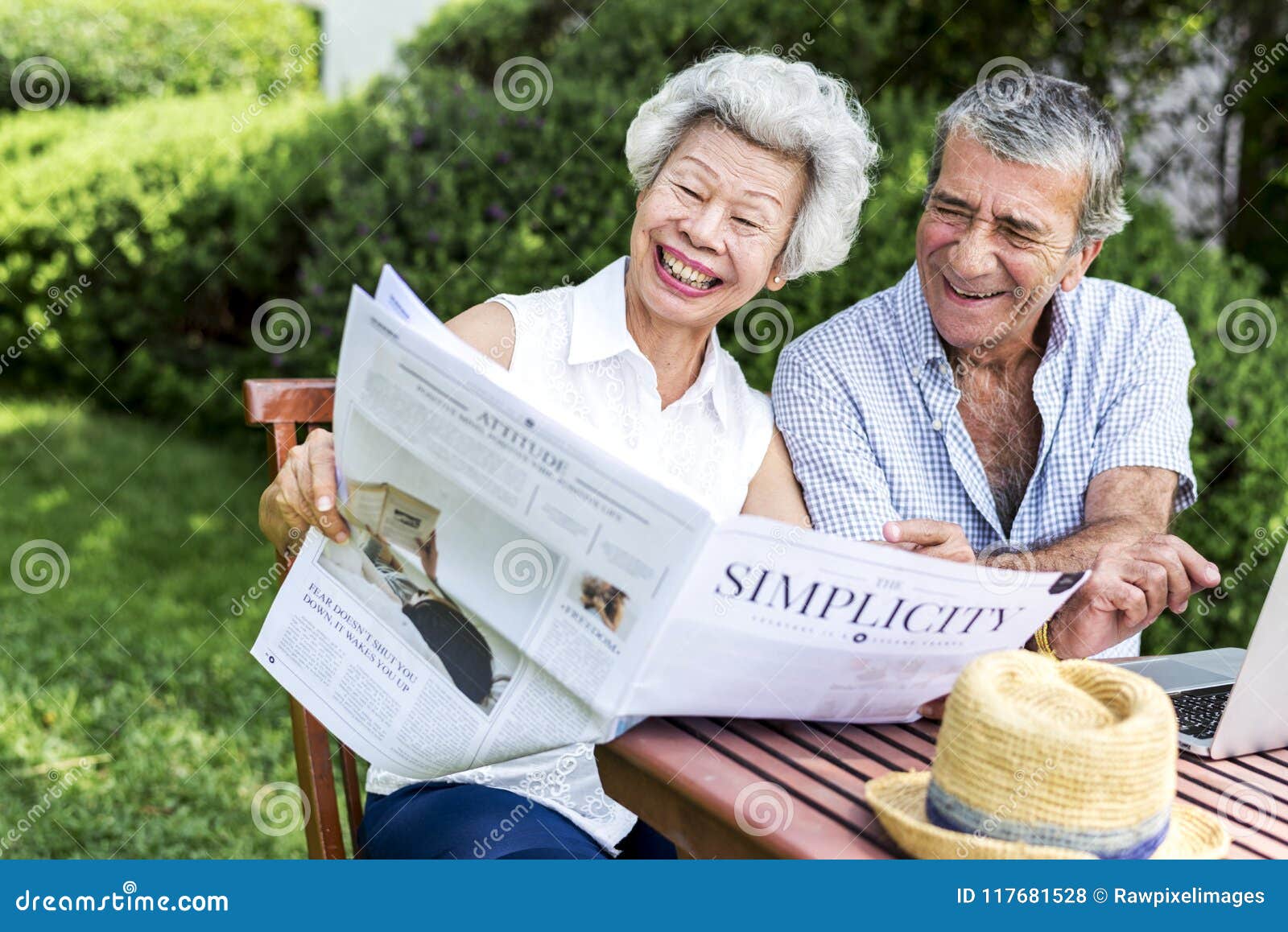 Senior Couple Reading Newspaper Together Stock Photo - Image of emotion ...