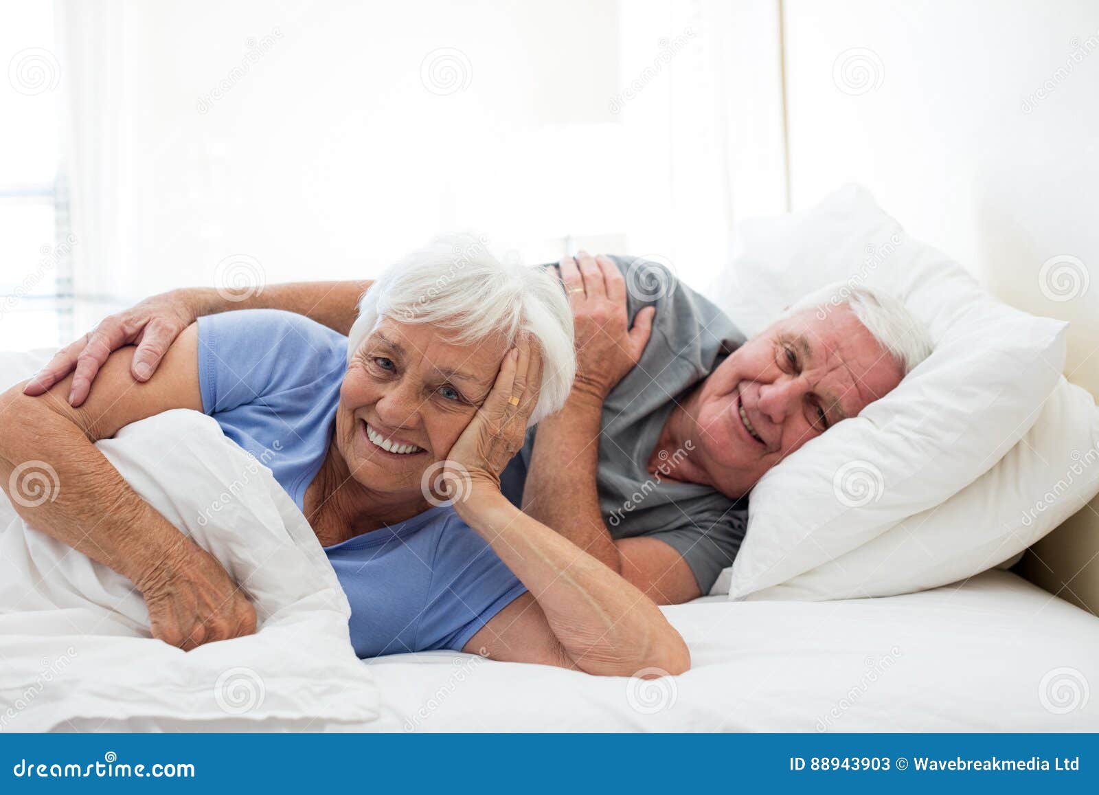 Senior Couple Relaxing in the Bedroom Stock Image - Image of love ...