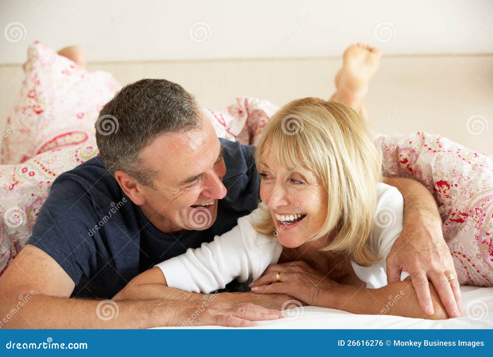 Senior Couple Relaxing Together in Bed Stock Photo - Image of caucasian ...