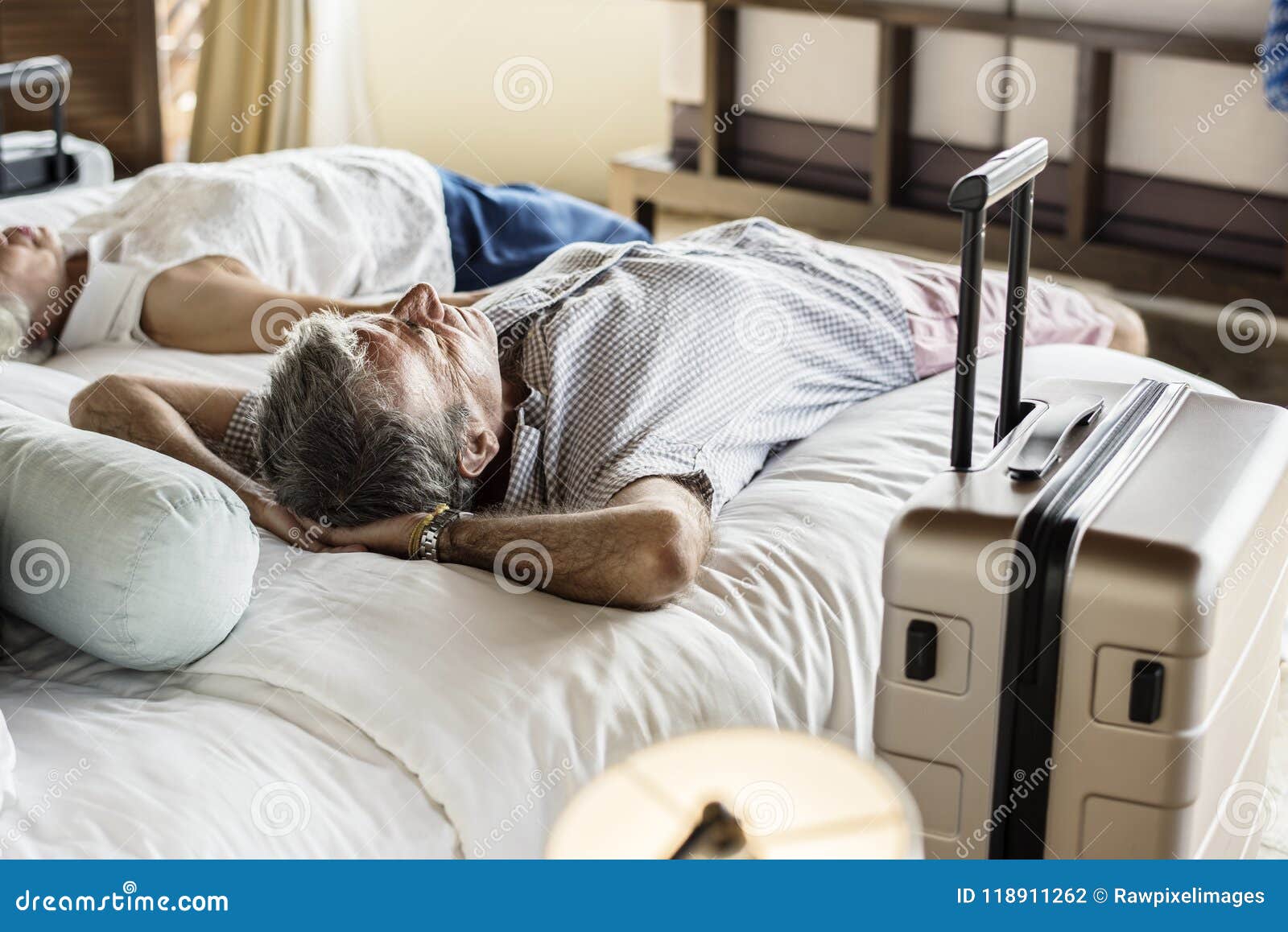 Senior Couple Resting on a Bed Stock Photo - Image of husband ...