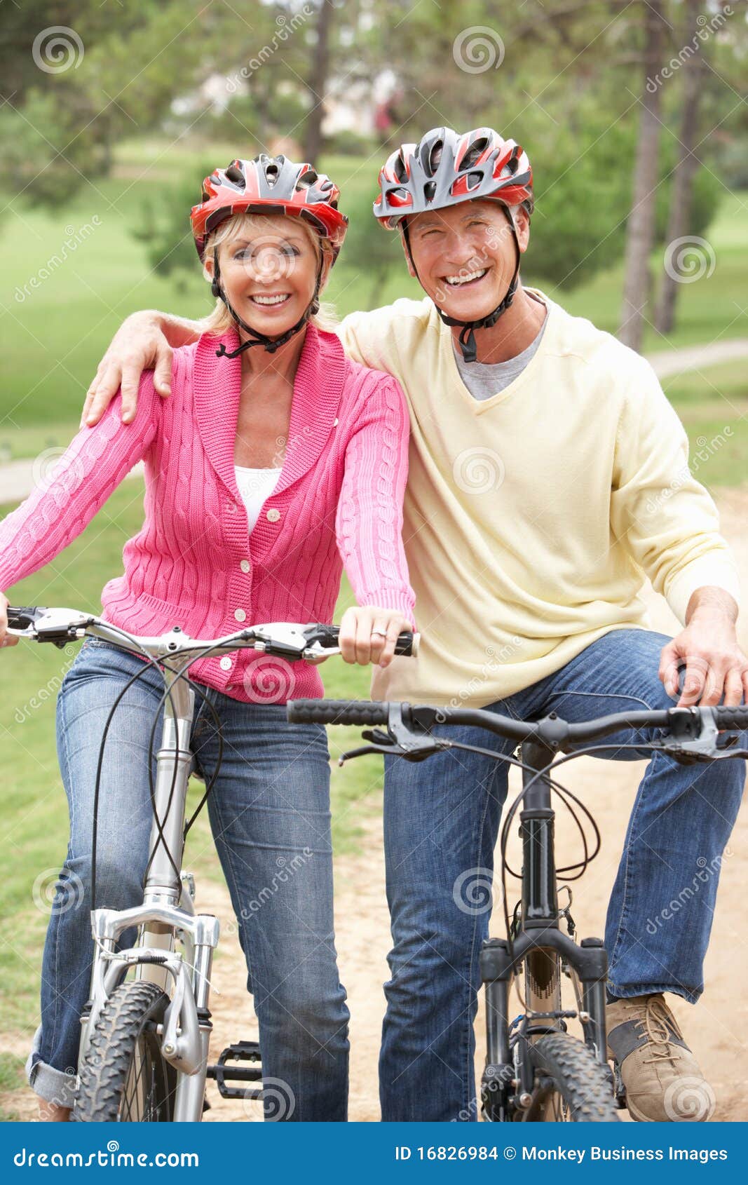 Senior Couple Riding Bicycle in Park Stock Photo - Image of outdoors ...