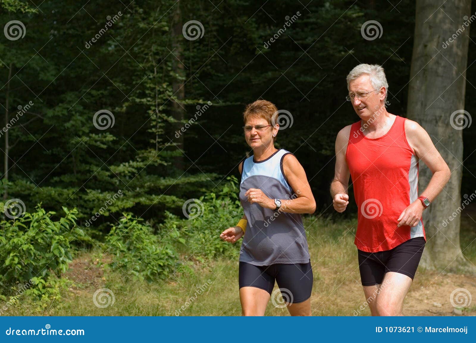 Senior couple running stock image. Image of leaning, male - 1073621