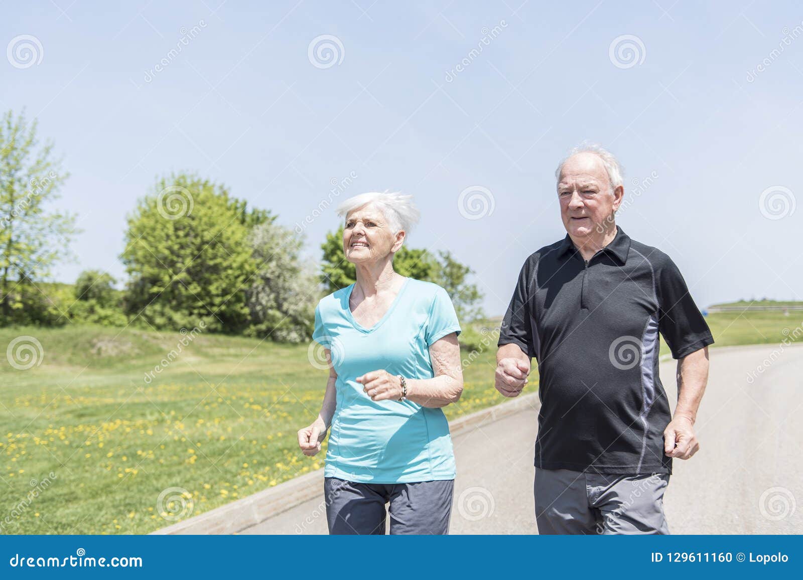 Senior Couple Running in Park Stock Photo - Image of couple, happiness ...