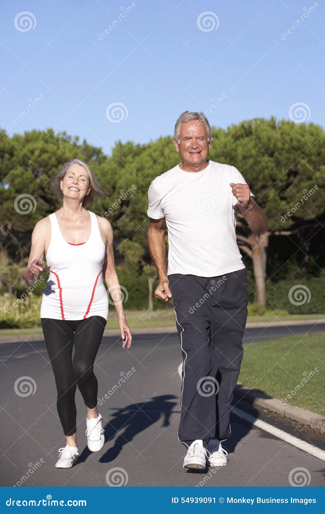 Senior Couple Running on Road Stock Image - Image of outdoor, person ...