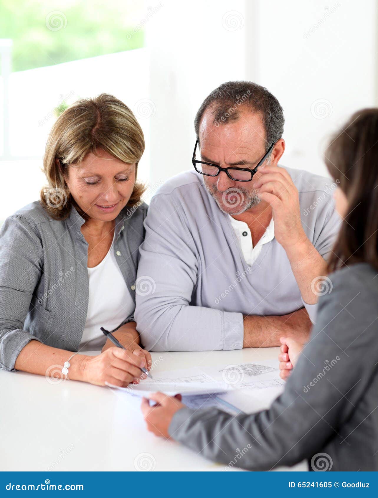 Senior Couple Signing Contract Stock Image - Image of insurance, aged ...