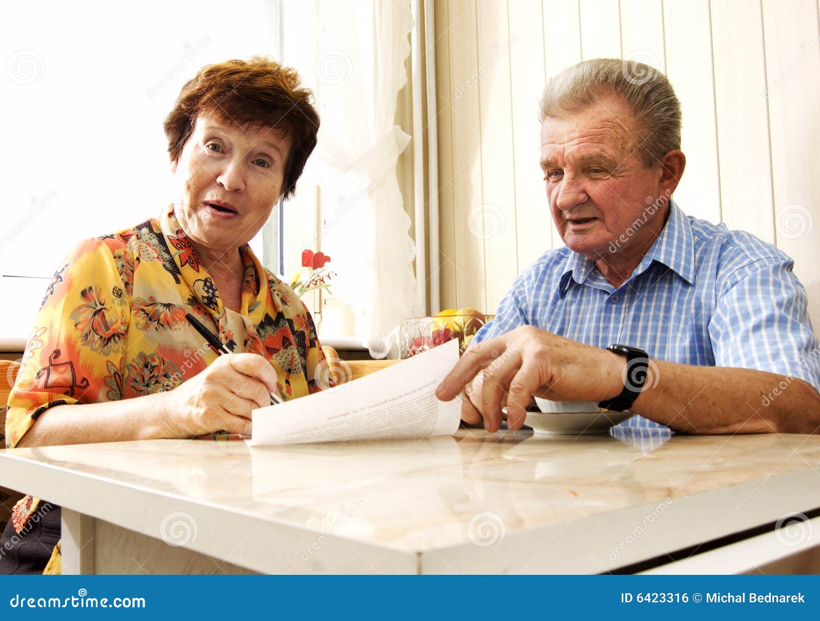 Senior Couple Signing Document Stock Photo - Image of family, caucasian ...