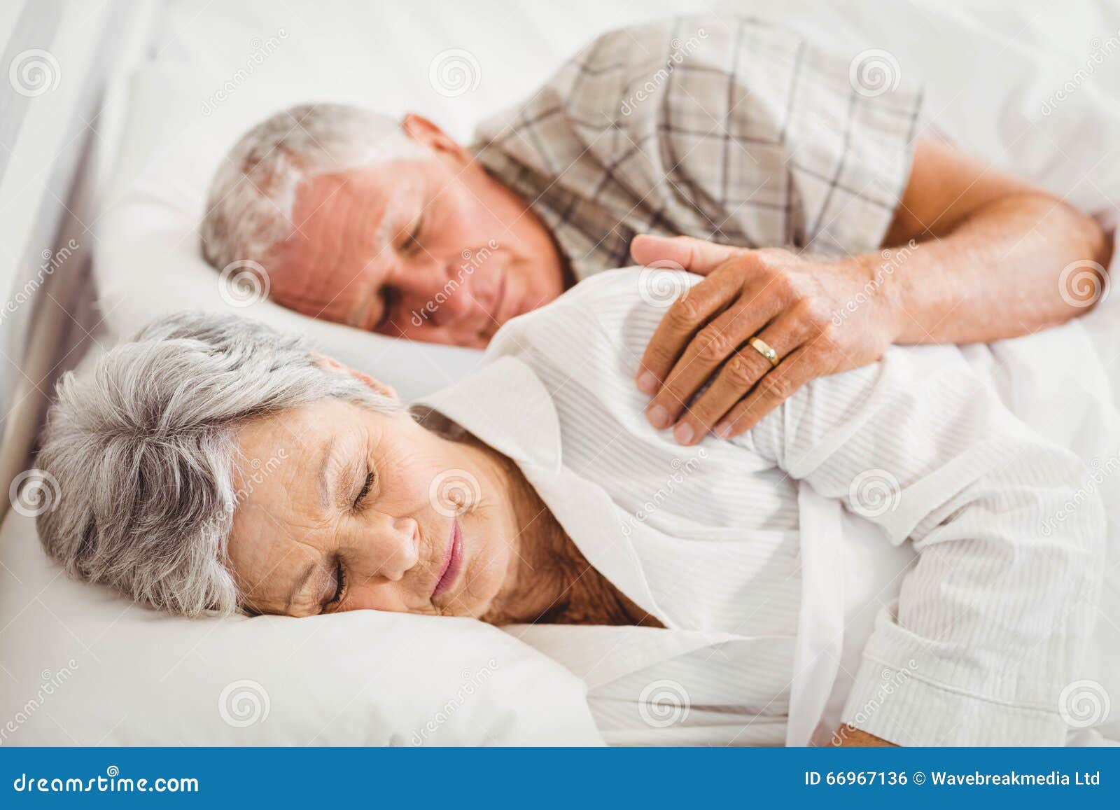 Senior Couple Sleeping on Bed Stock Photo - Image of household ...