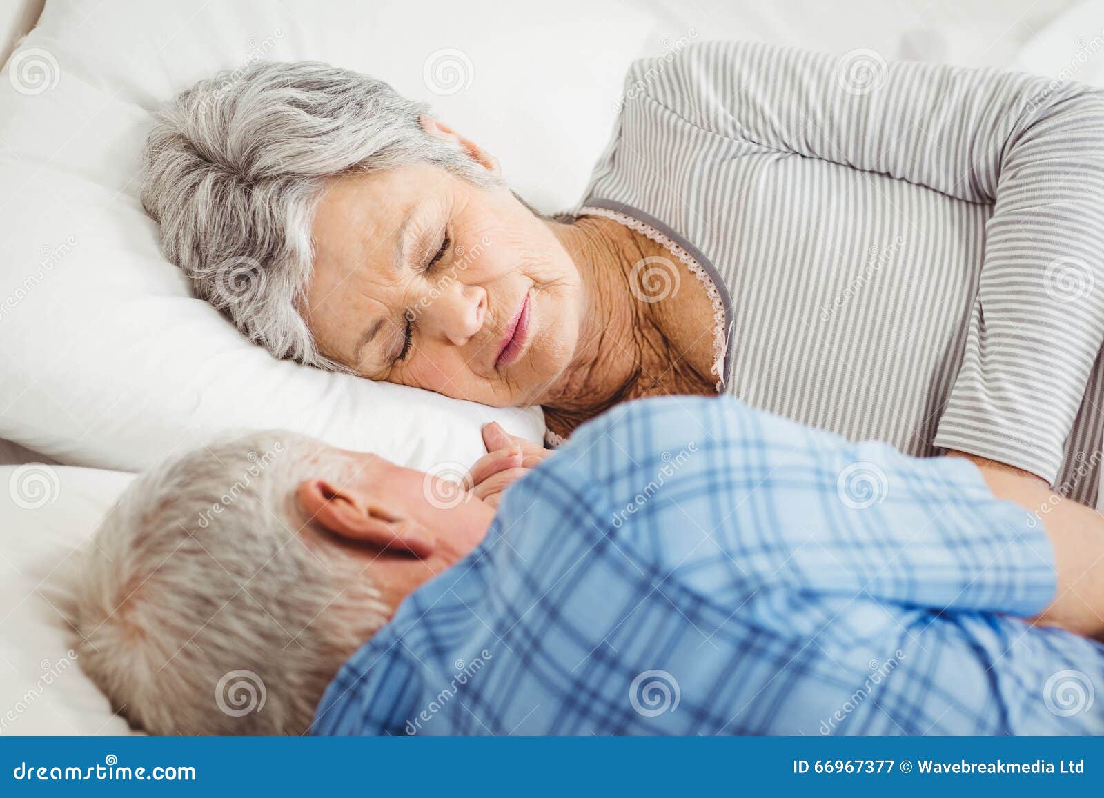 Senior Couple Sleeping on Bed Stock Image - Image of male, closeup ...
