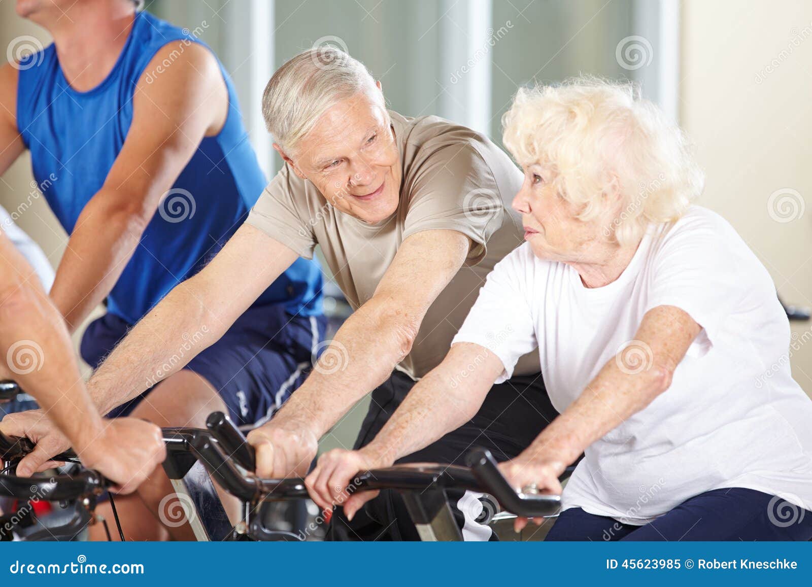 Senior Couple Talking in Spinning Stock Image - Image of bike, elderly ...
