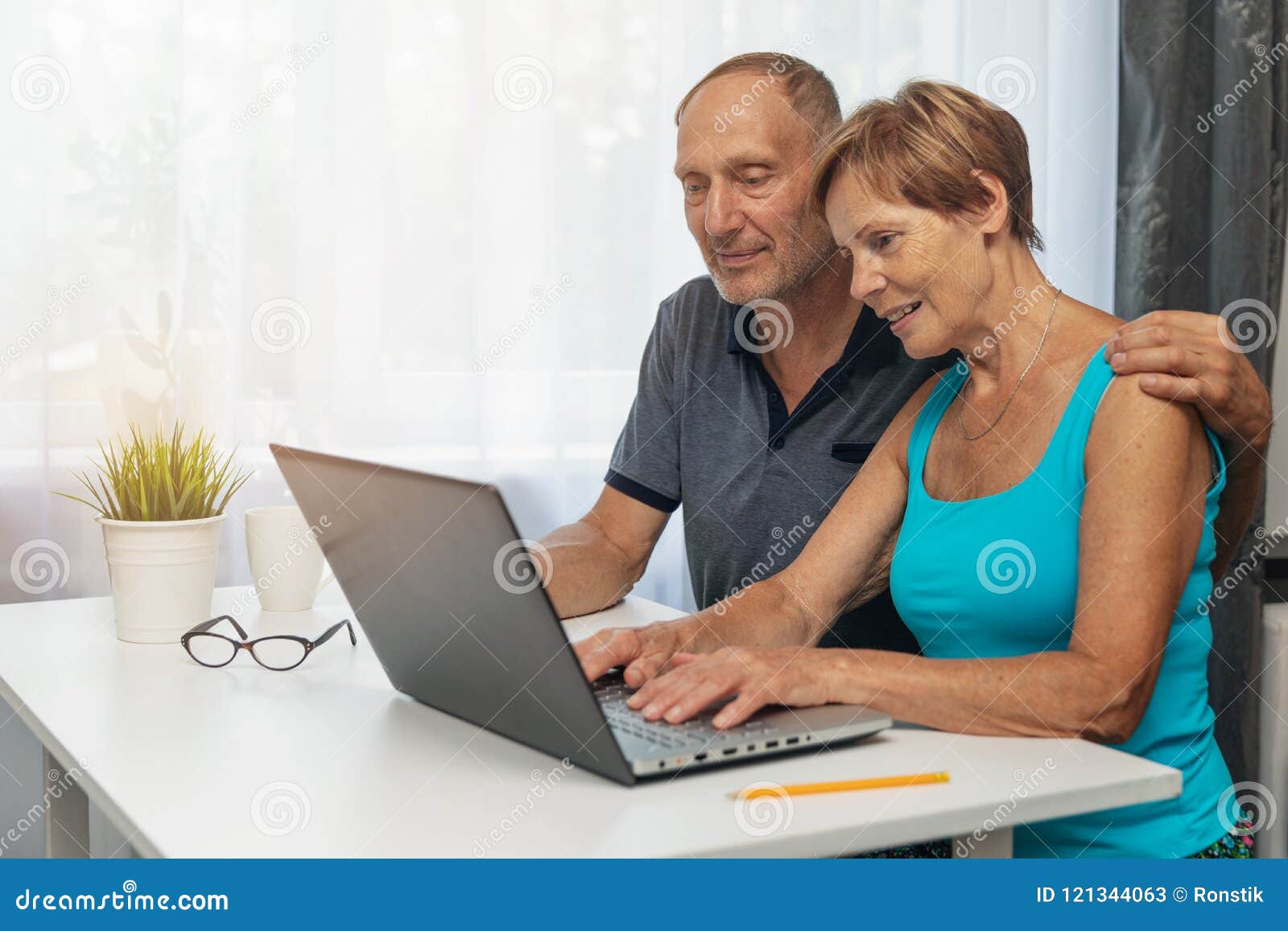 Senior Couple Using Laptop Computer Together Stock Image - Image of ...