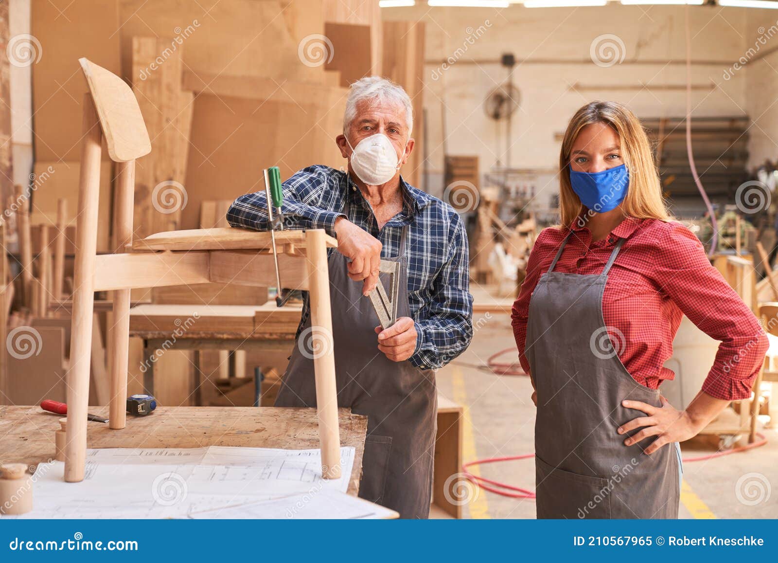 Senior Craftsman and Apprentice with Face Mask Stock Image - Image of ...