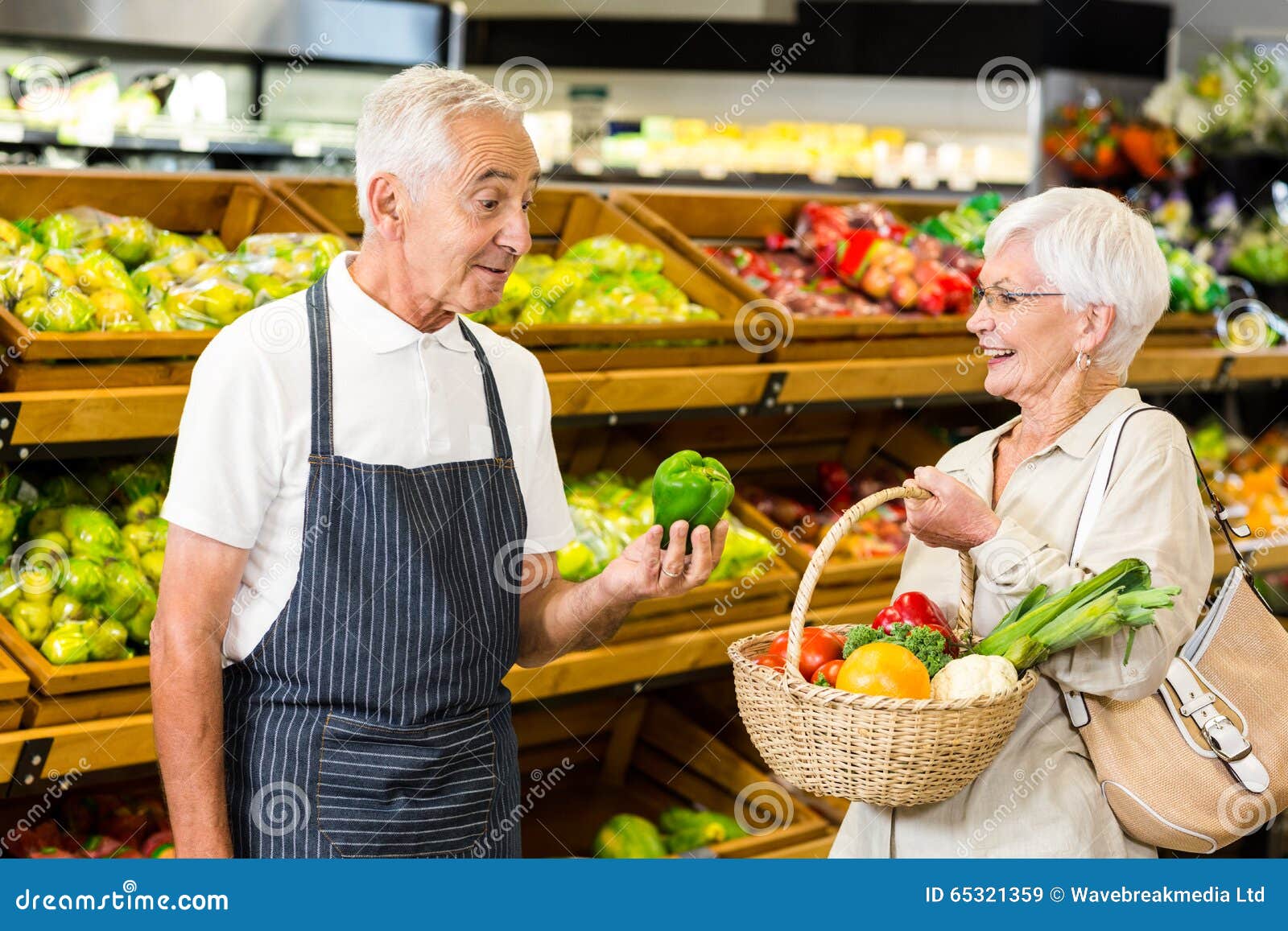 Senior Customer and Worker Discussing Vegetables Stock Image - Image of ...
