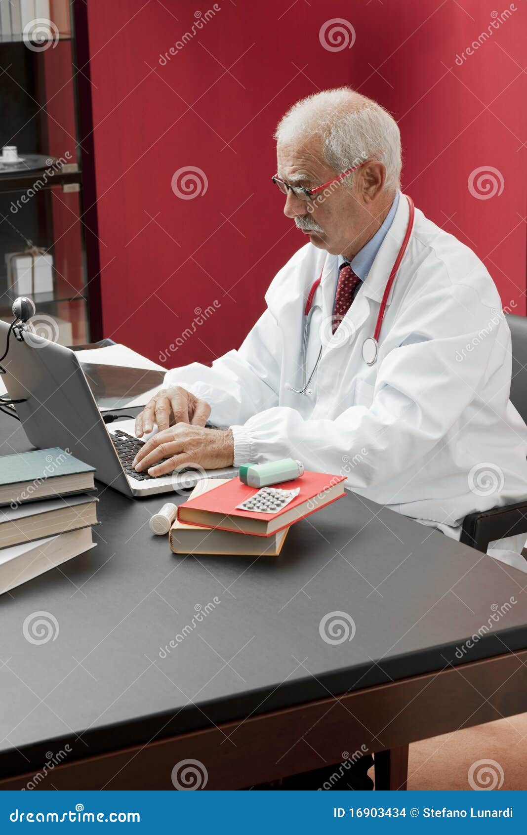 Senior Doctor stock photo. Image of concentration, adult - 16903434