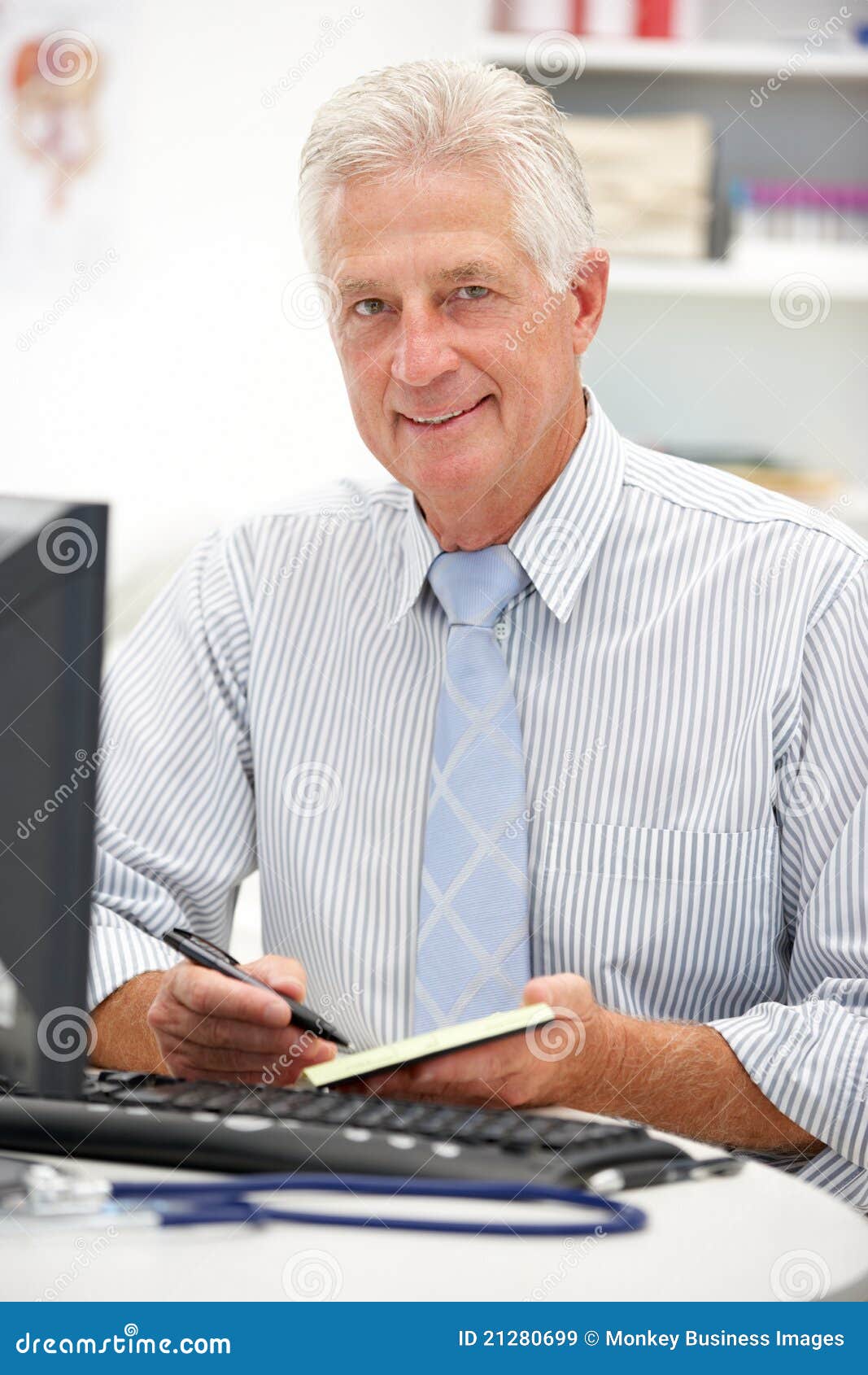 Senior doctor at desk stock image. Image of doctor, indoors - 21280699