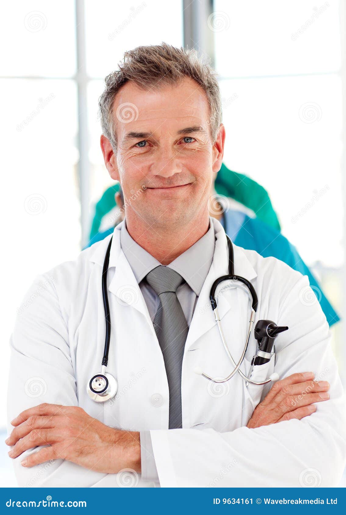 Senior Doctor with Folded Arms Stock Image - Image of practicioner ...
