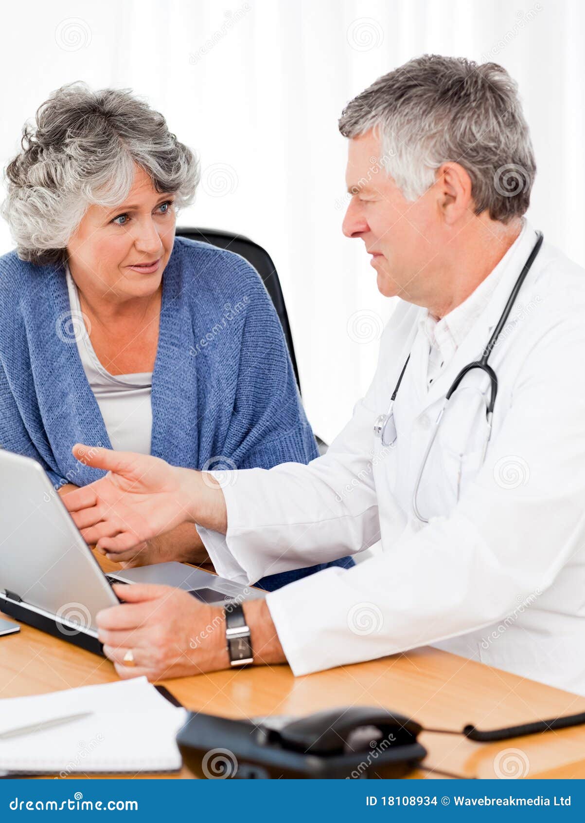 A Senior Doctor with His Patient Stock Photo - Image of manual, room ...