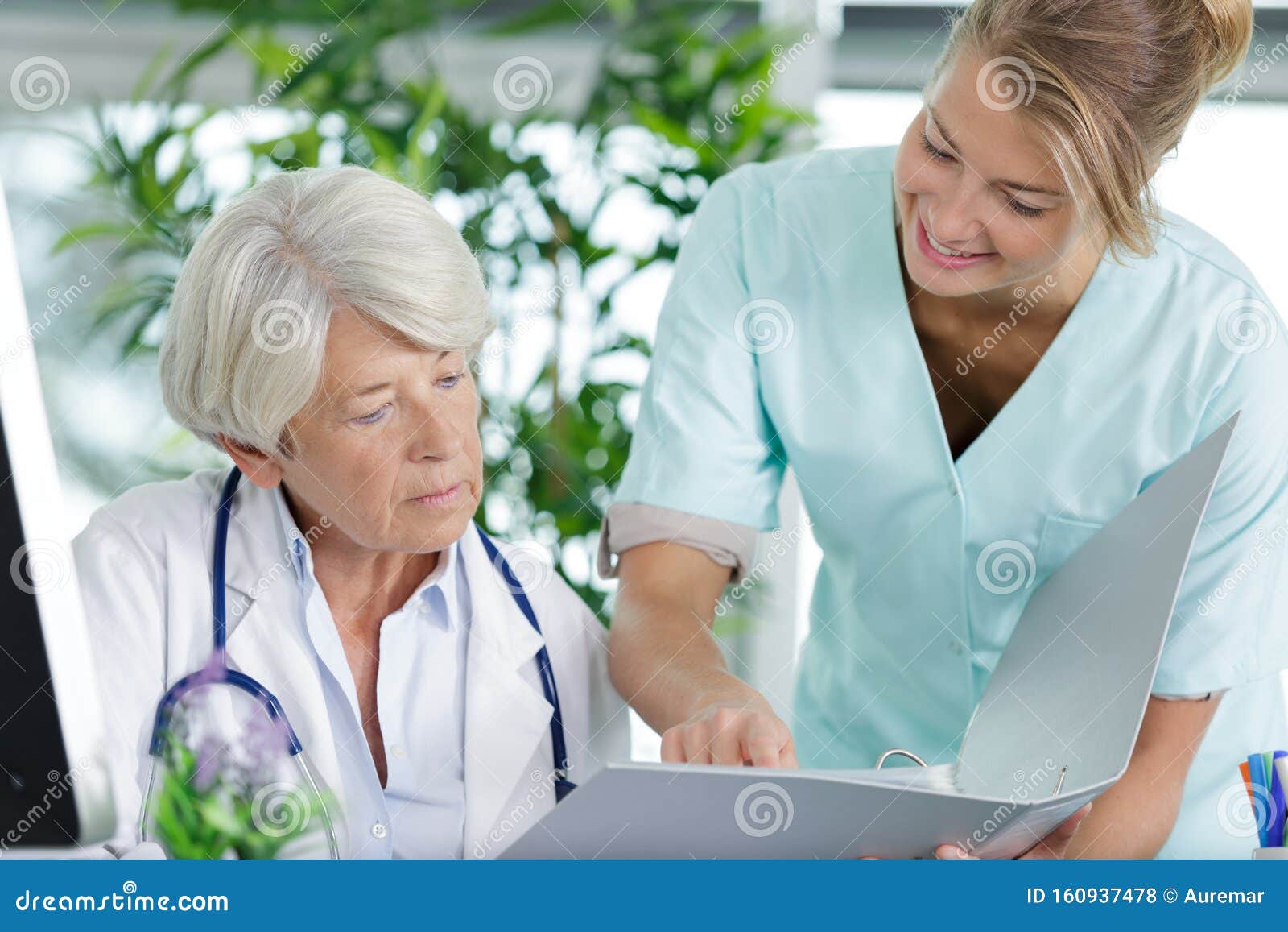 Senior Doctor Leads Team Nurses Stock Photo - Image of medicare, group ... Senior Doctor Leads Team Nurses Stock Photo - Image of medicare, group ...
